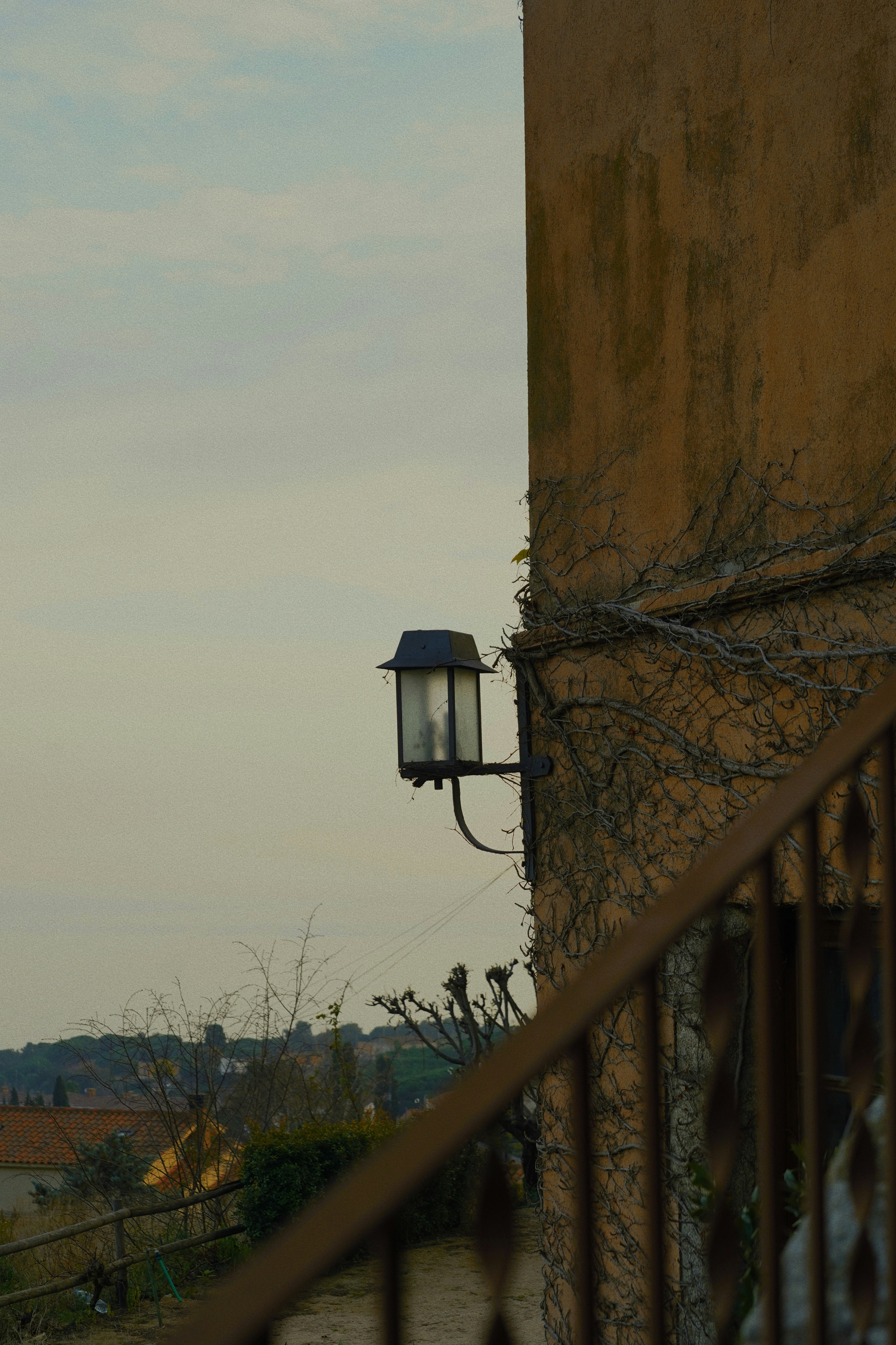 Lamppost at Dusk: A Quiet Block on the Hill
