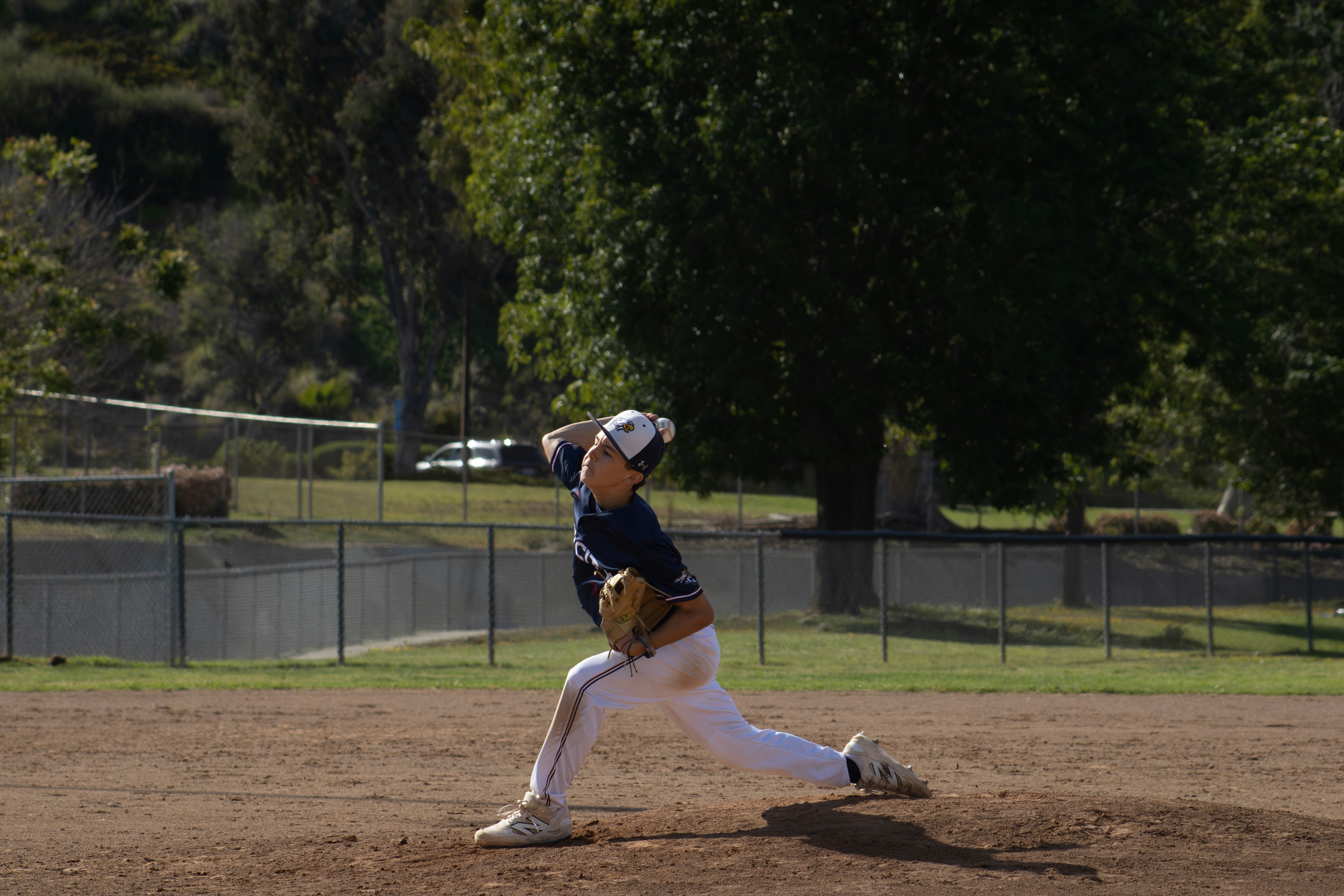 A baseball player is in mid-pitch. photo – Free Image on Unsplash