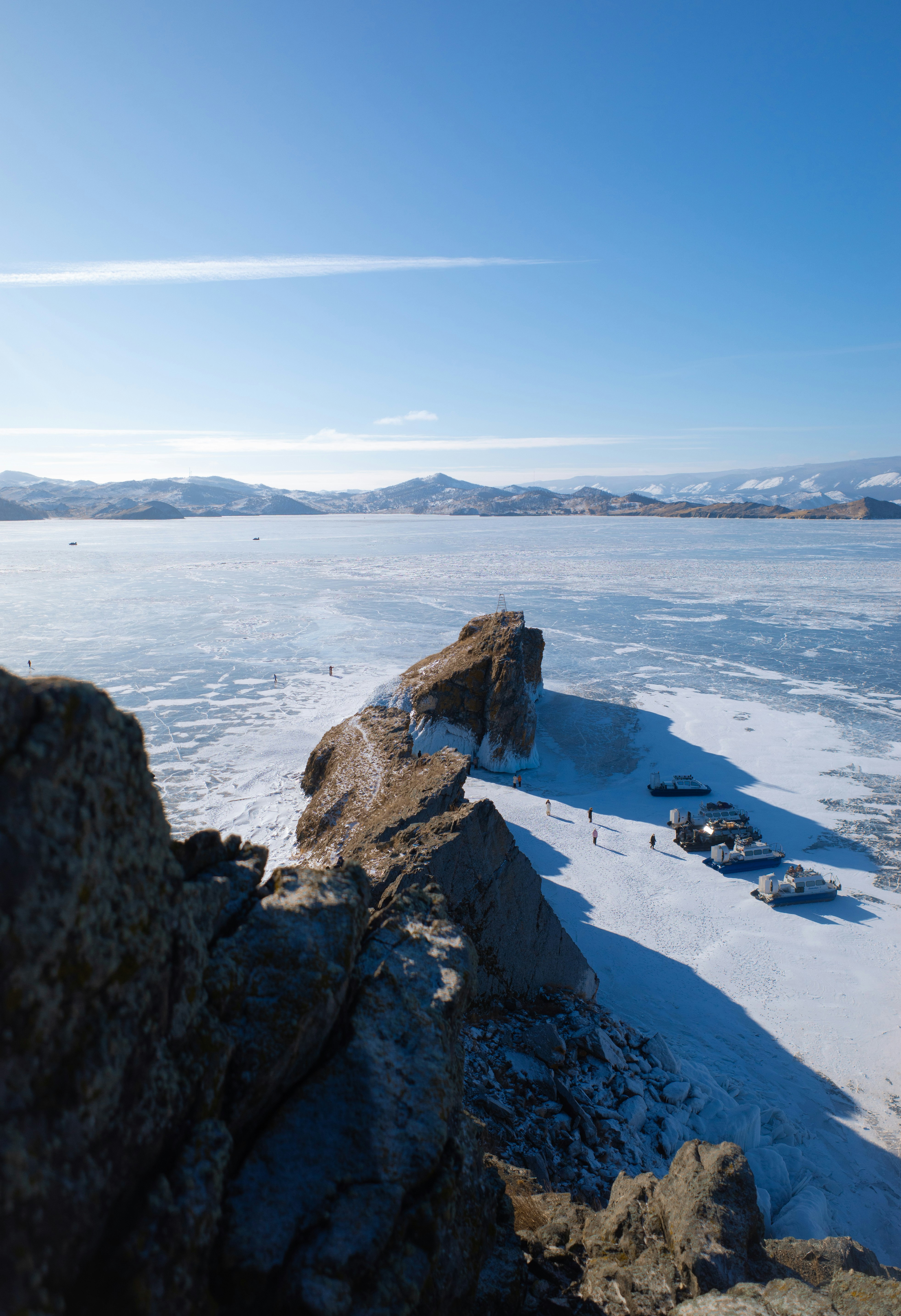 Icebound Cliffs: A Cascade of Shadows on the Frozen Shore