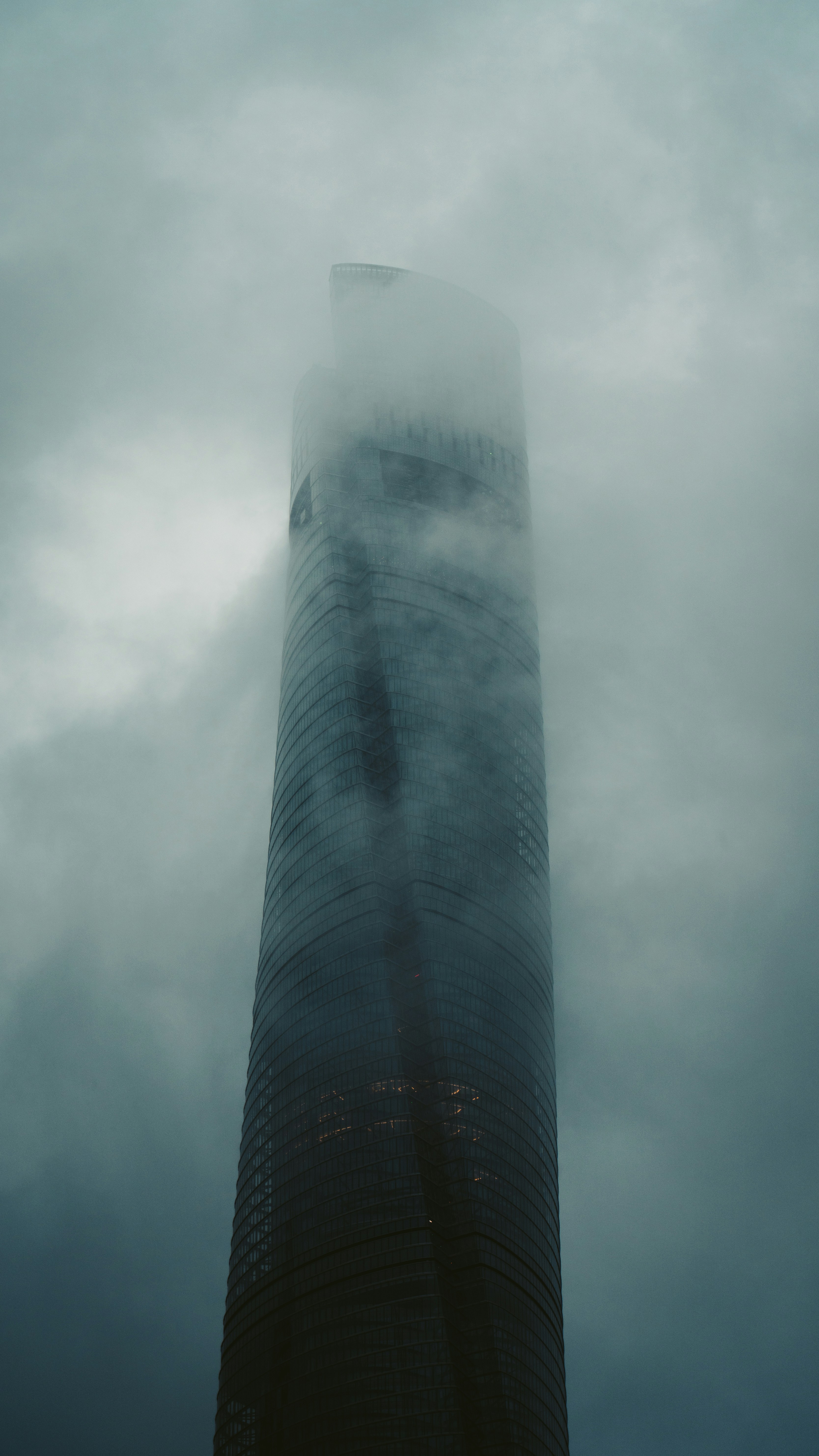 Veiled Verticality: The Tower in the Mist