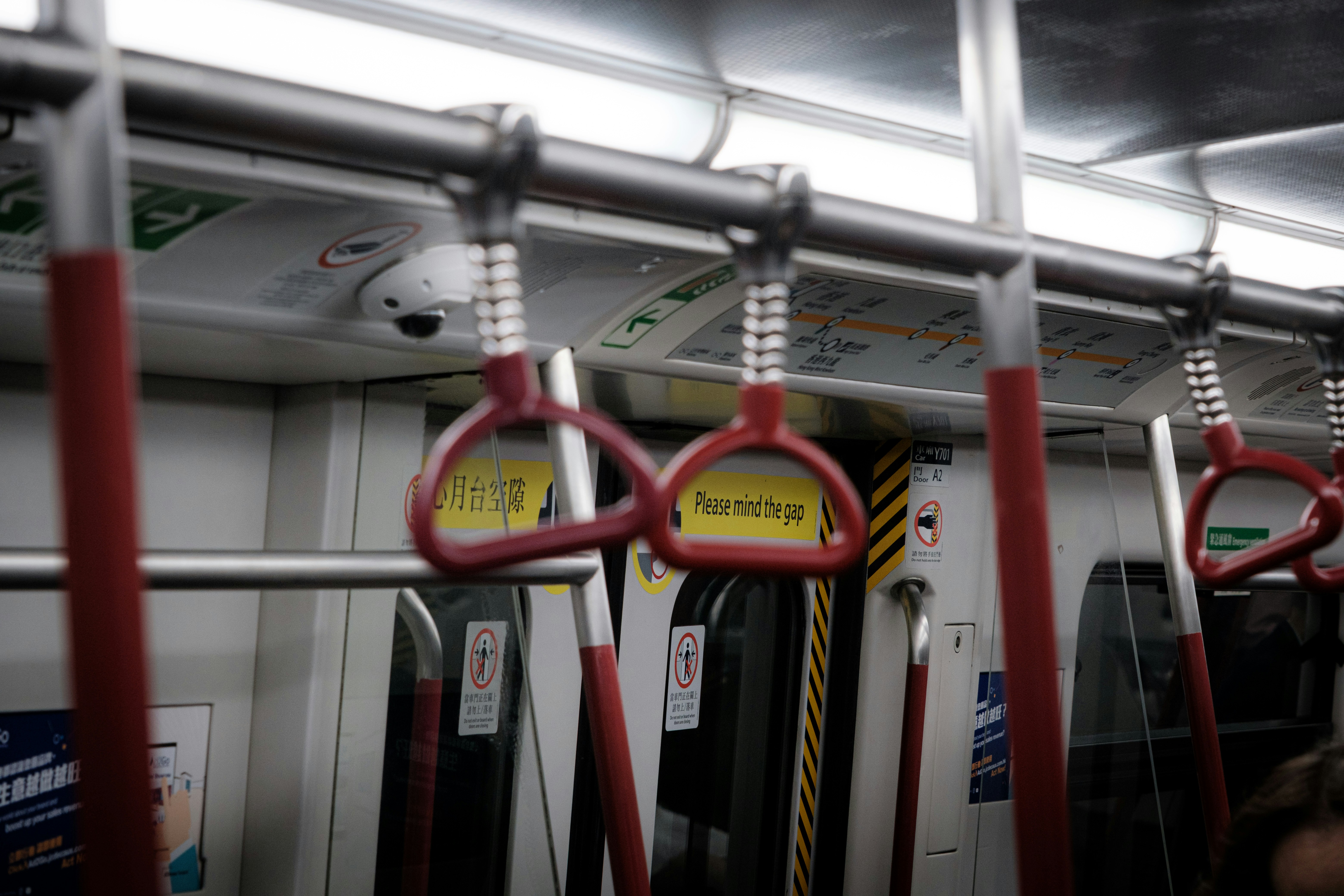Inside a train carriage, hand straps hang down. photo – Free Subway ...