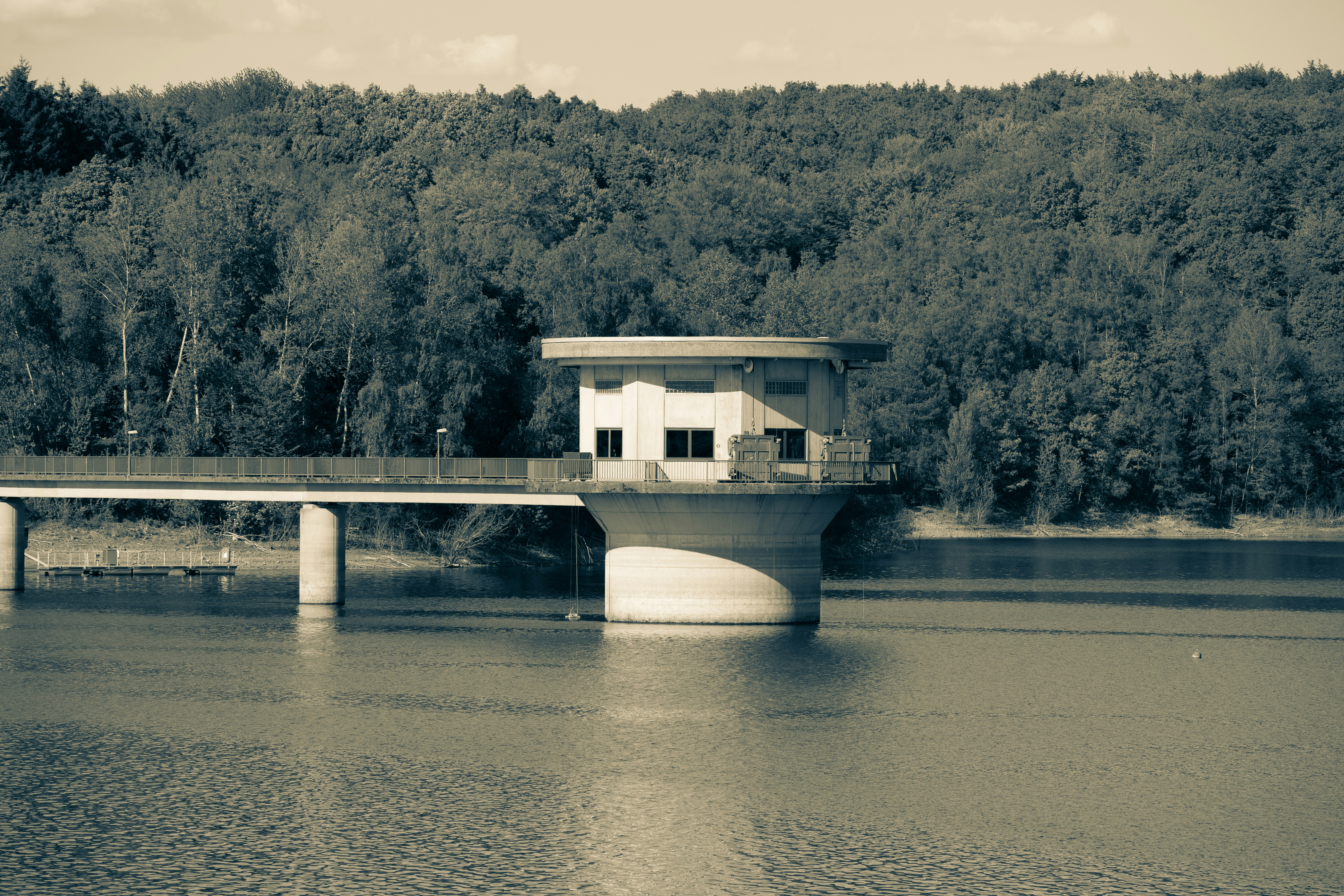 Sepia Sentinel: The Bridgehouse Over Quiet Waters