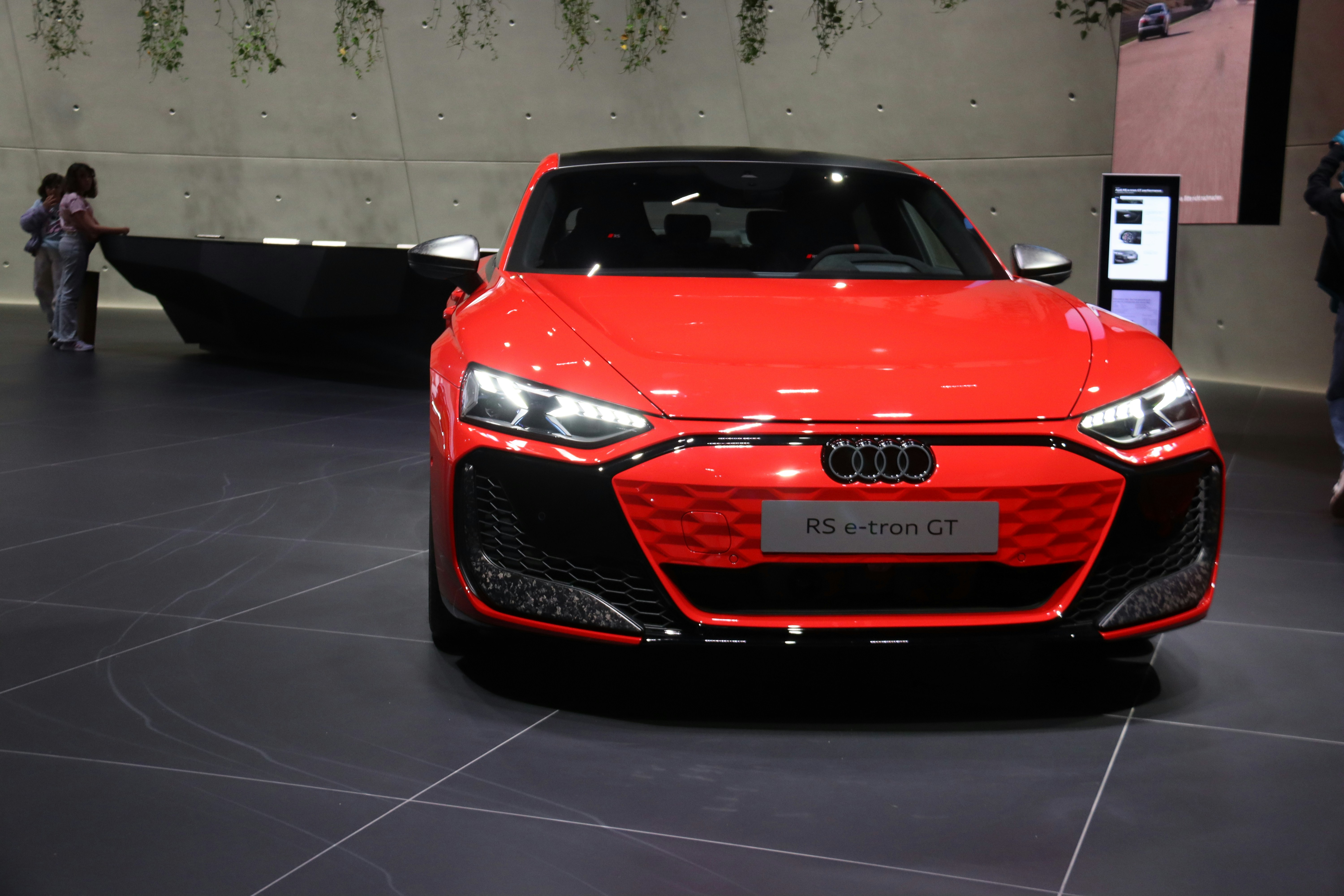 A bright red audi s1 e-tron on display. photo – Free Germany Image on ...