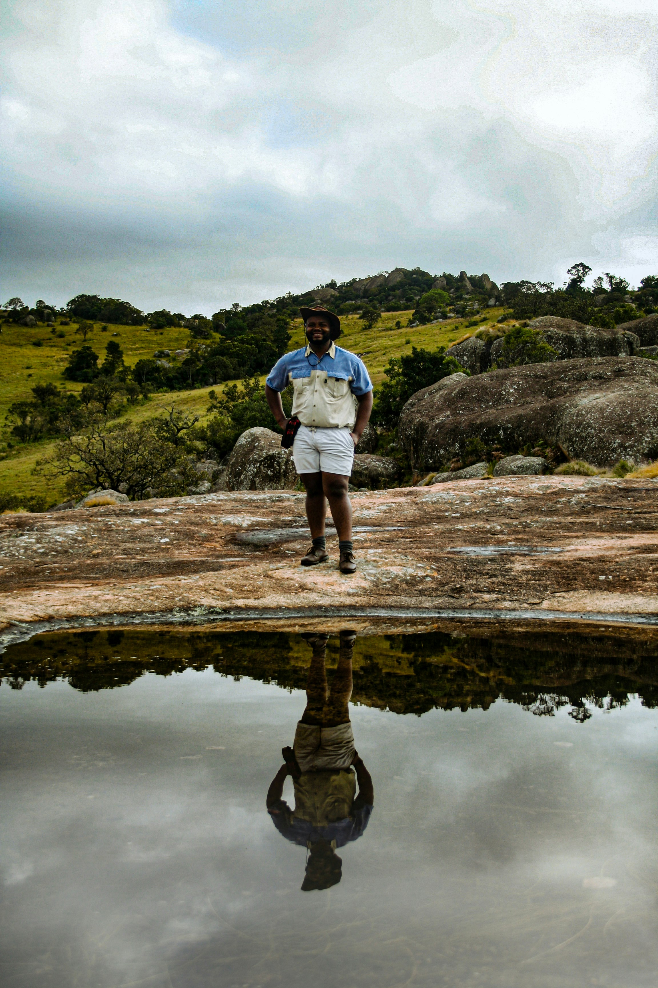 Horizon Walker: Man in Field with Silent Reflection