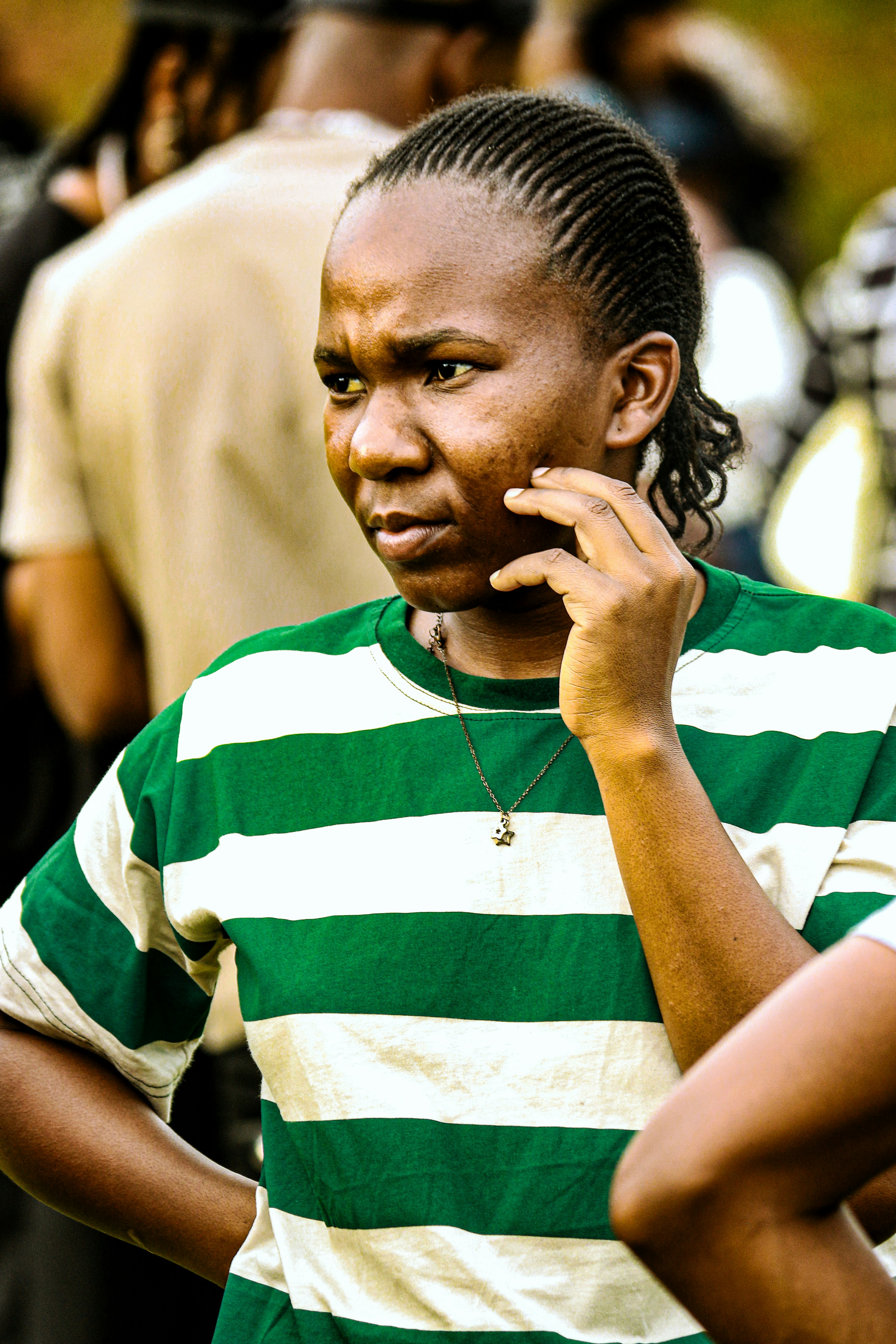 Contemplation Amid a Murmur of Faces