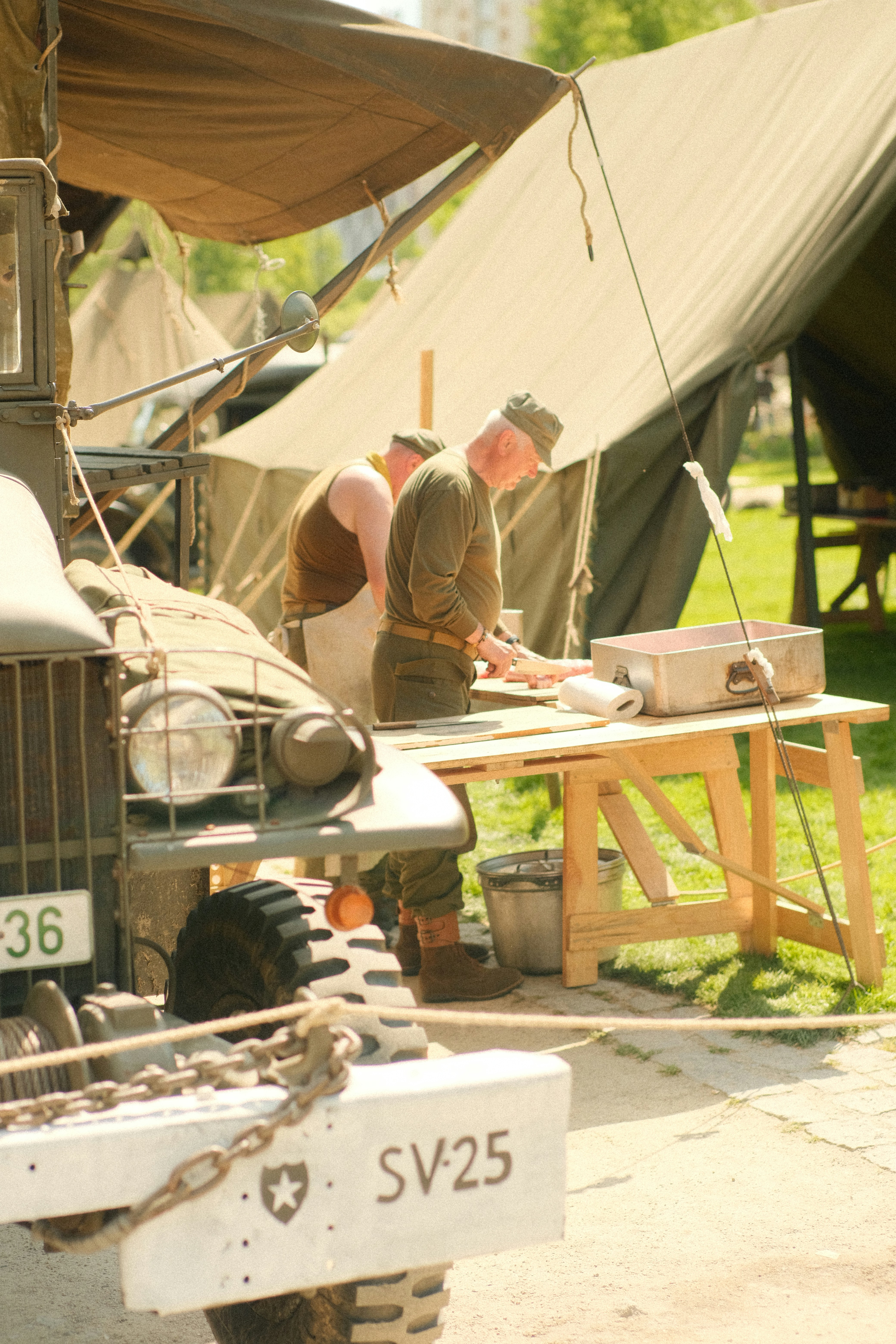 Workbench at Dawn: Soldiers Prepare a Camp Kitchen