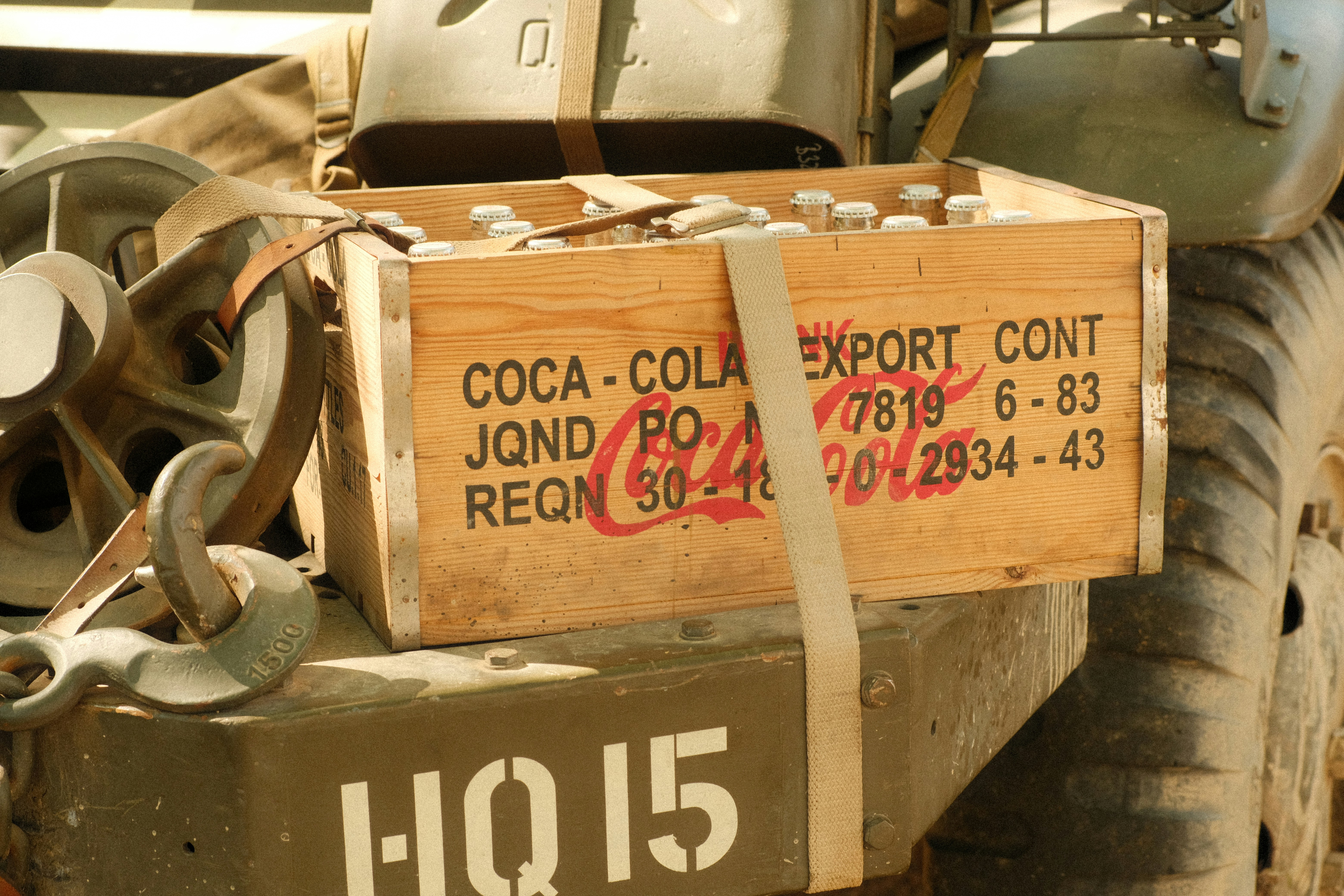 Vintage coca-cola crate resting on a military vehicle. photo – Free ...