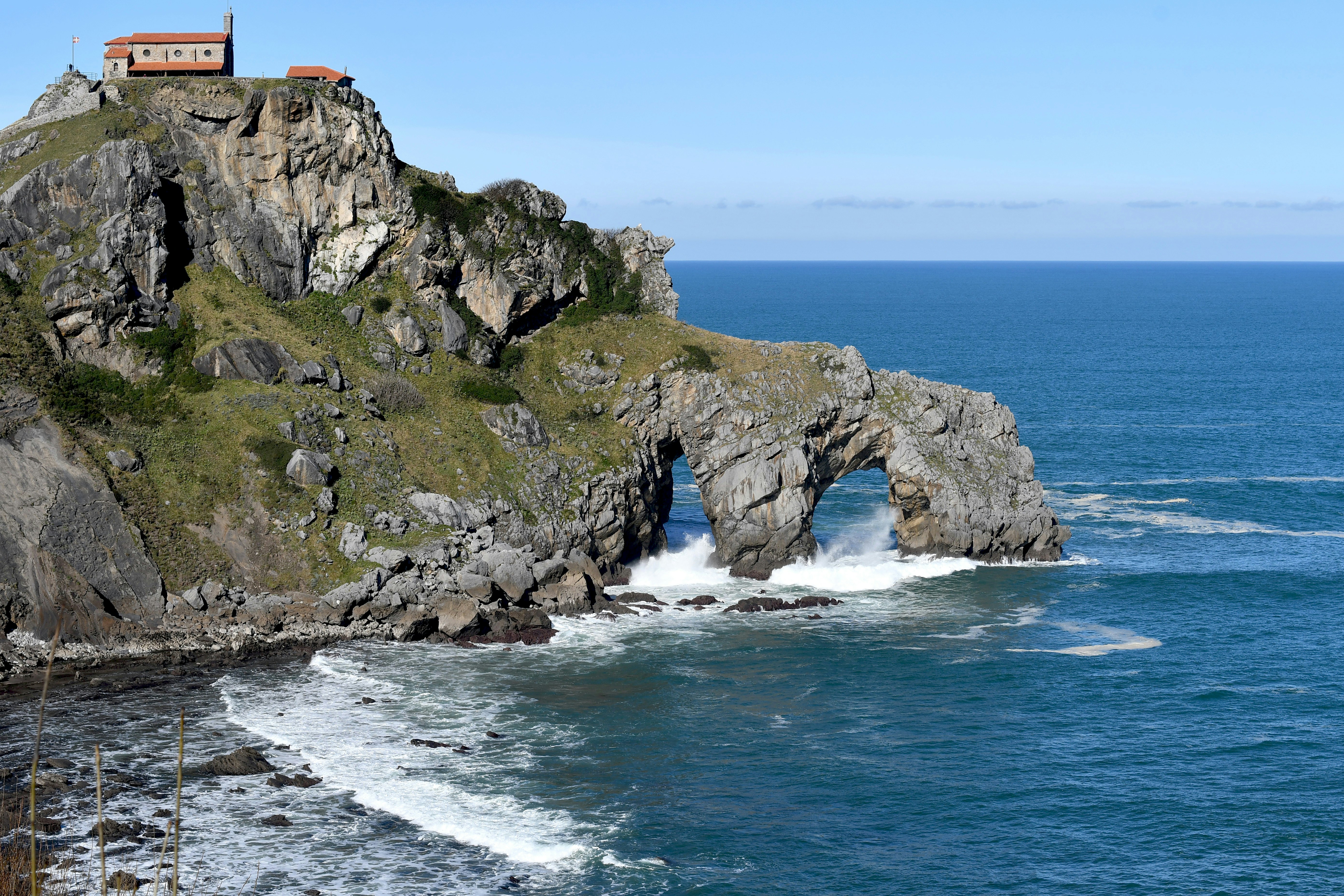 Dramatic cliffside view with a beautiful sea arch. photo – Free ...