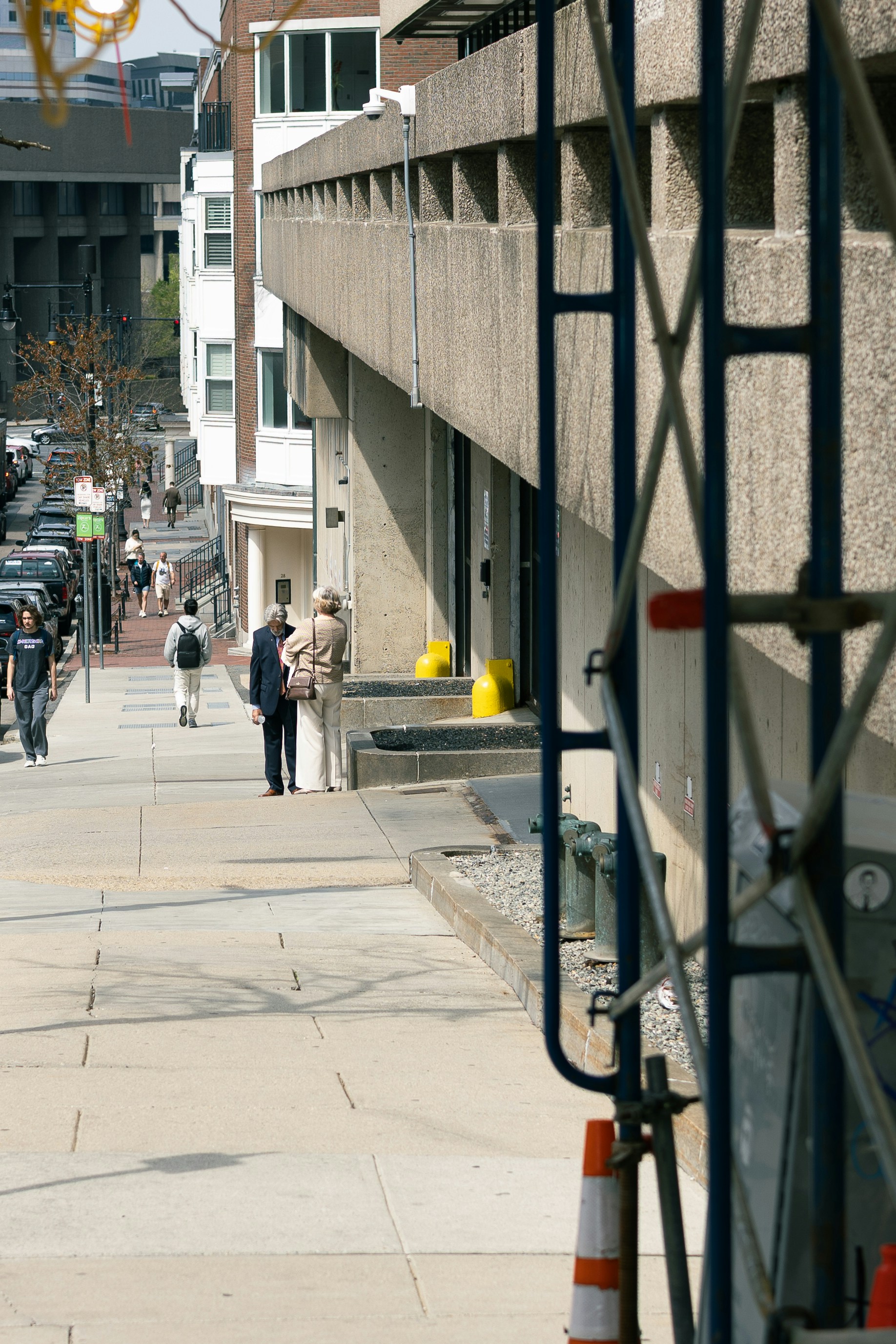Urban Threshold: Pedestrians at a Concrete Facade