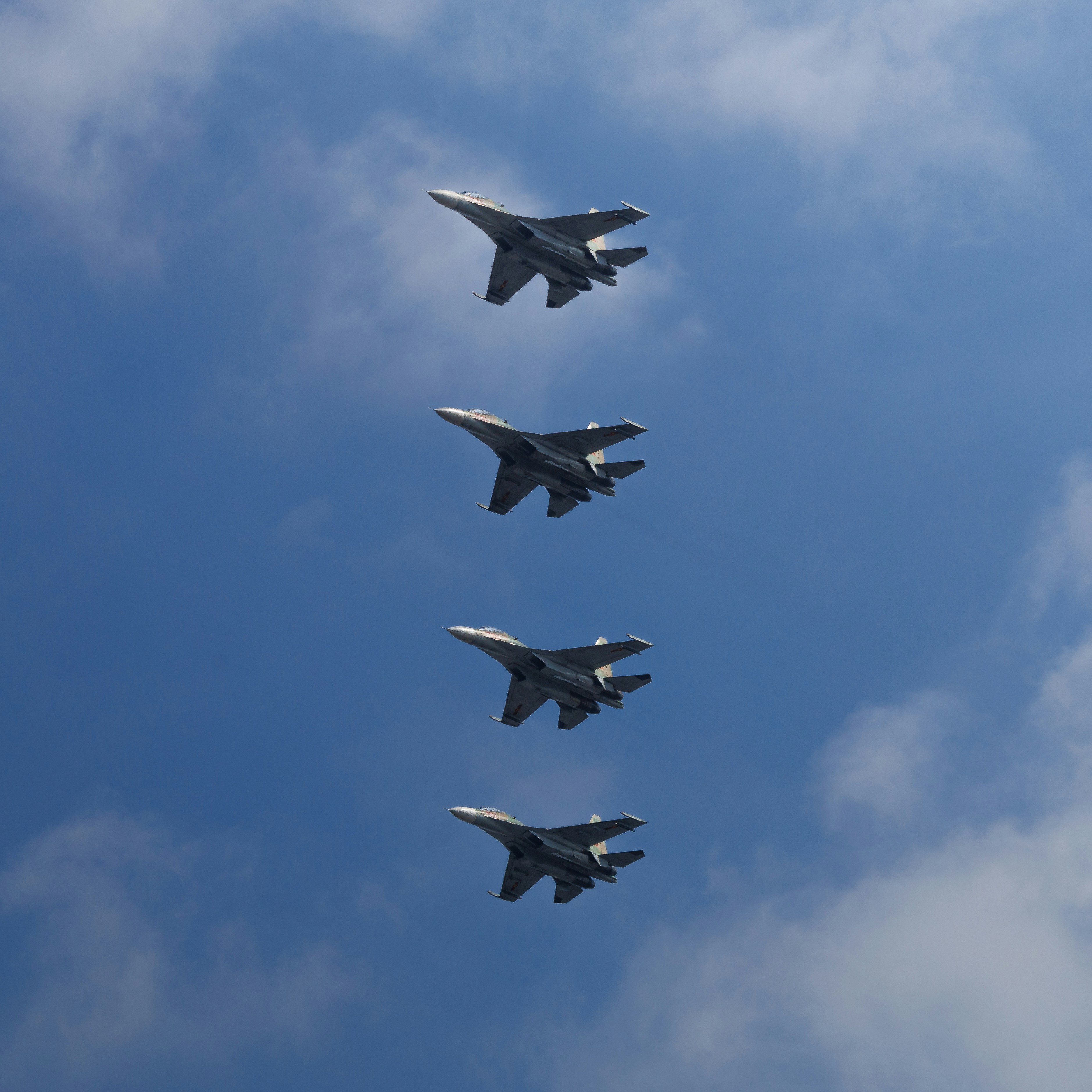 Four fighter jets fly across a bright blue sky. photo – Free Image on ...