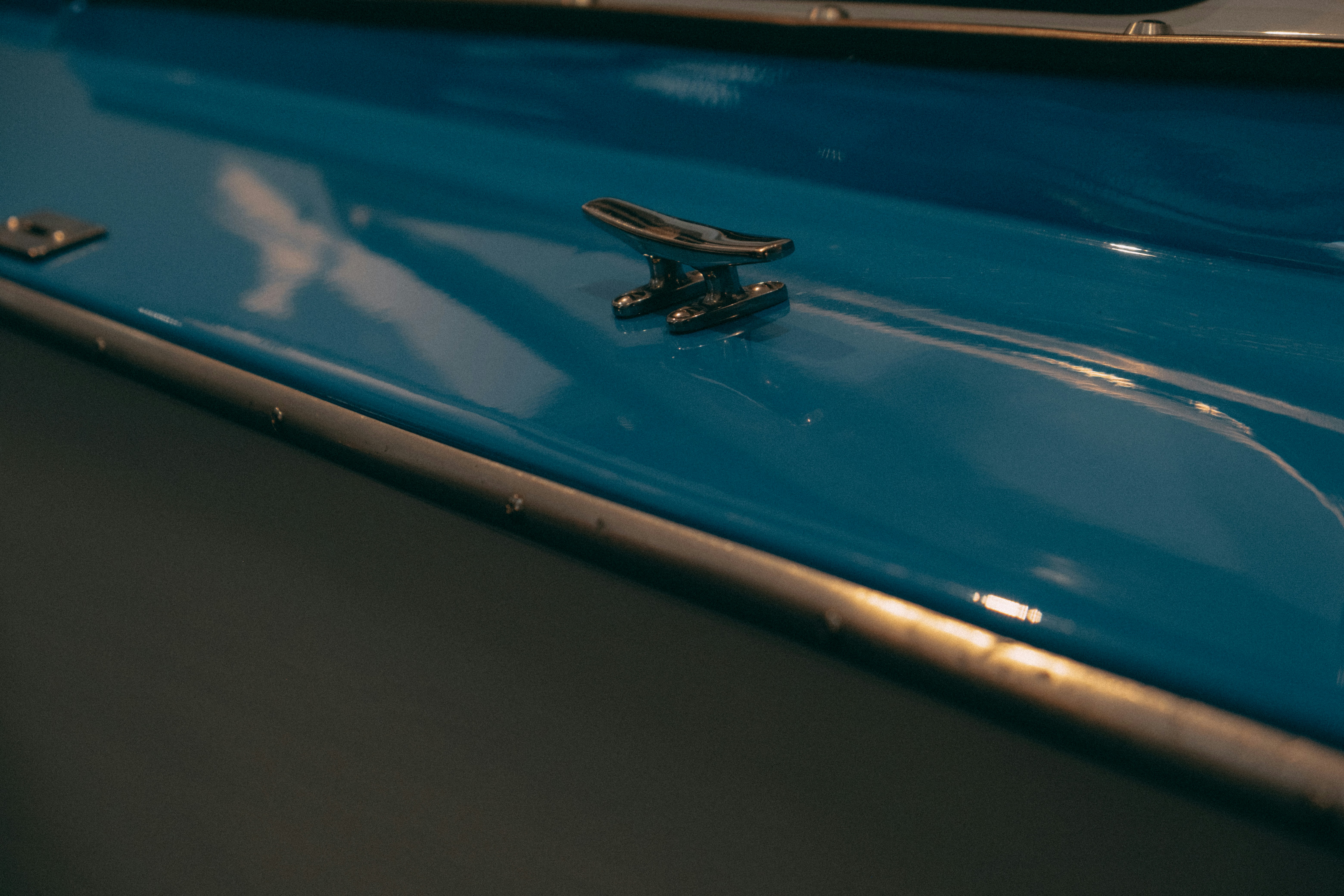 Cobalt Crest: Chrome Hood Ornament in Soft Studio Glow