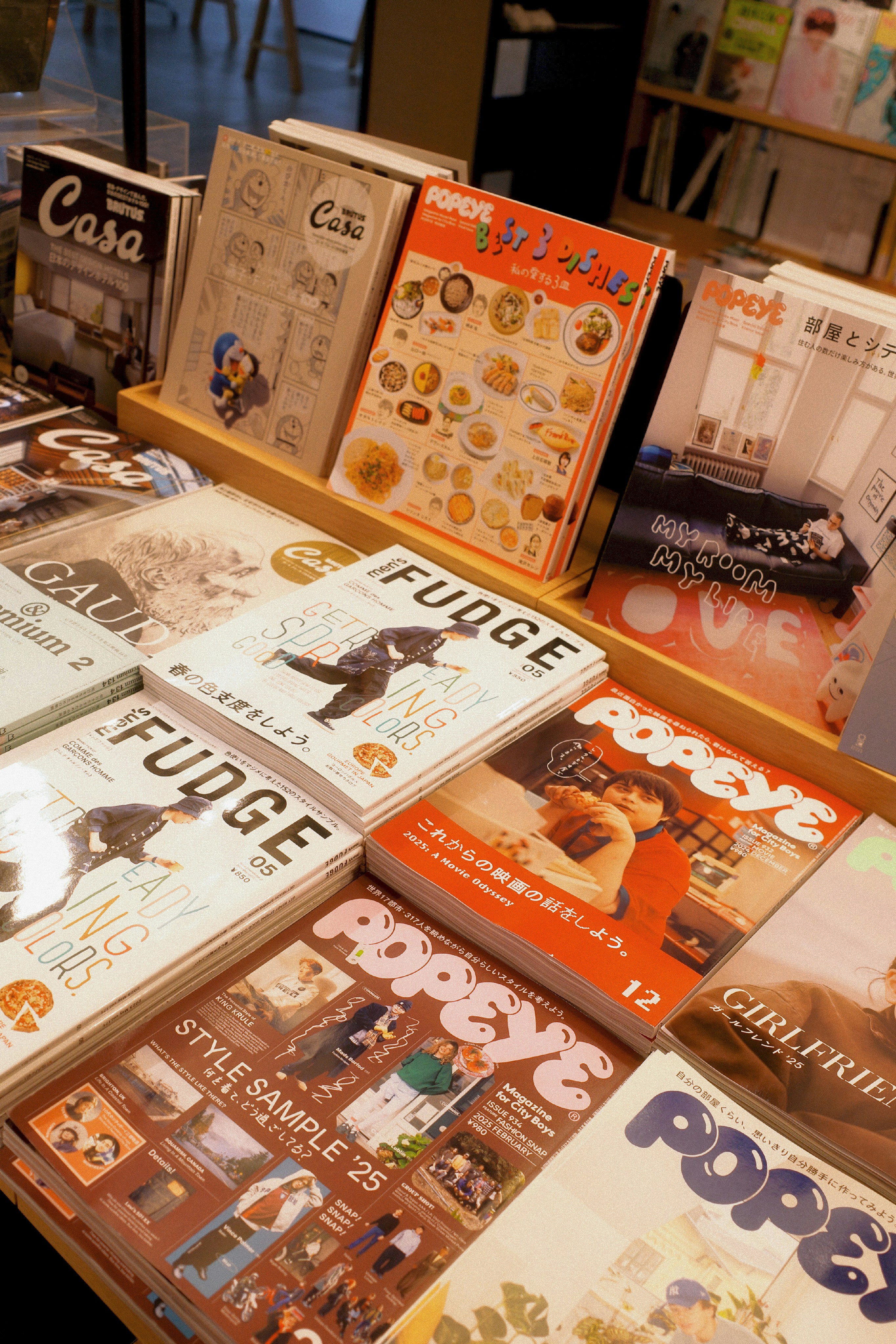 Magazines and books are on display. photo – Free Magazines Image on ...