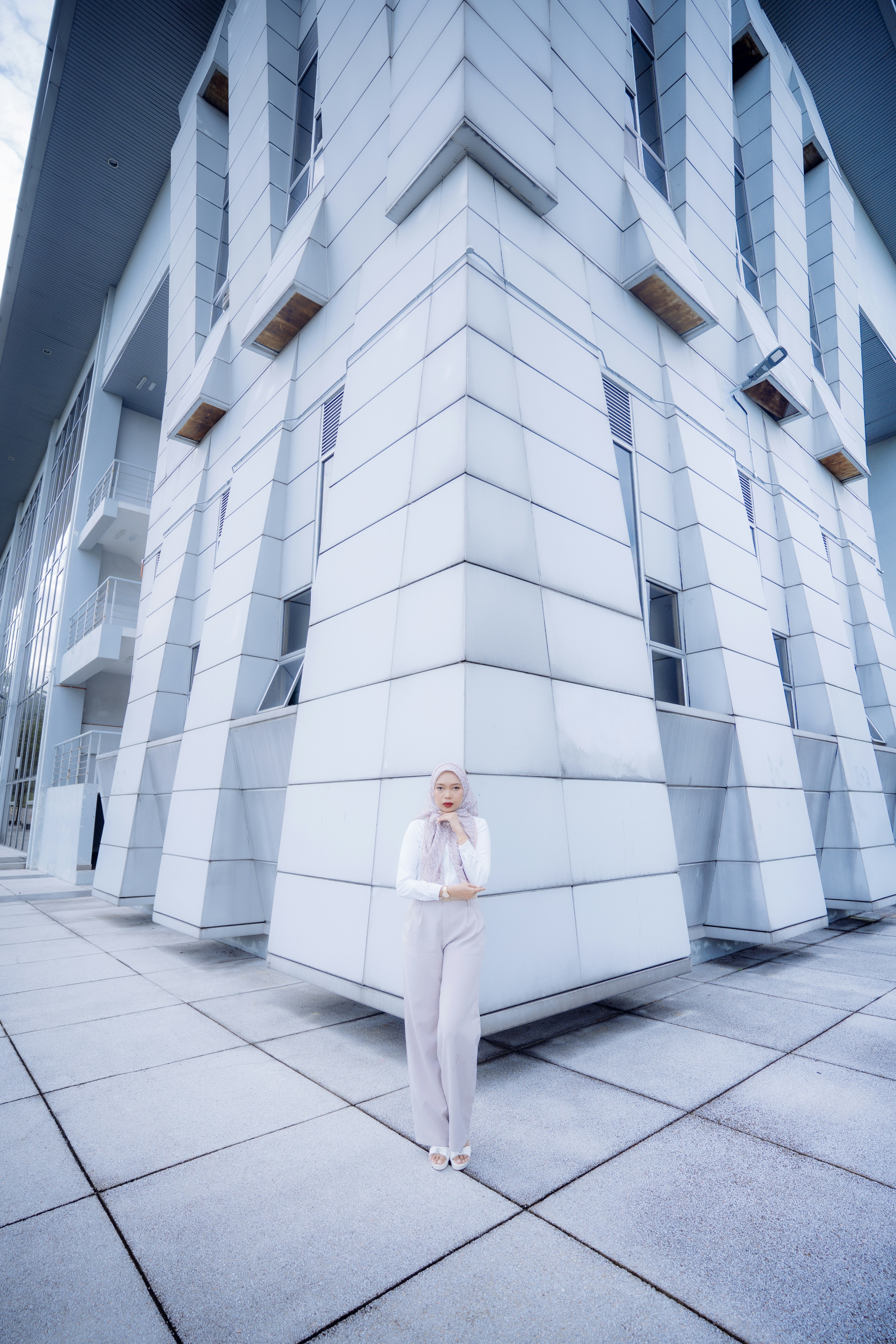 Silhouette in White: Portrait at a Faceted Monolith