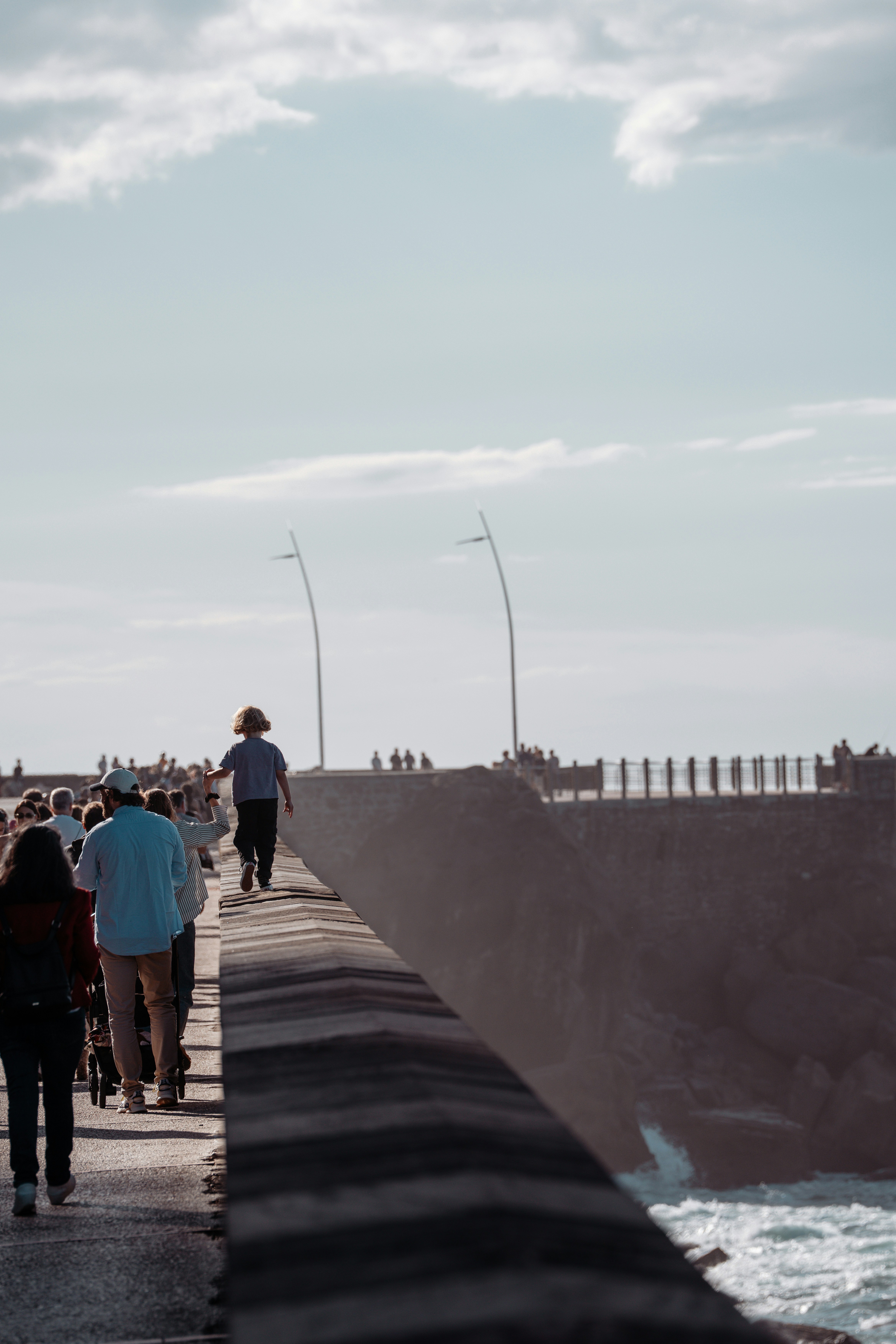 Toward the Horizon: A Quiet Parade Along the Pier