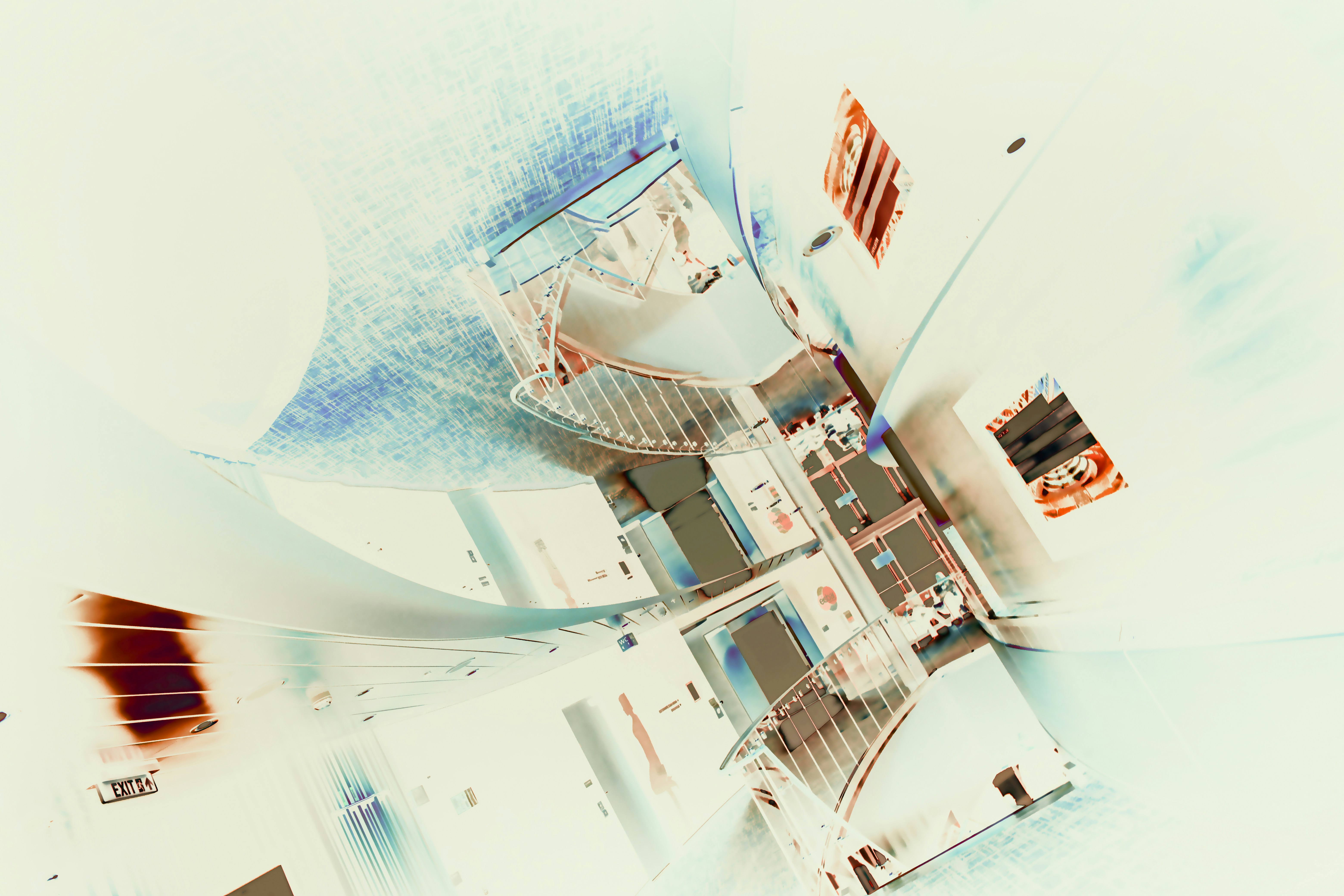 Ghostly Atrium Spiral: Overexposed Glass and Curves