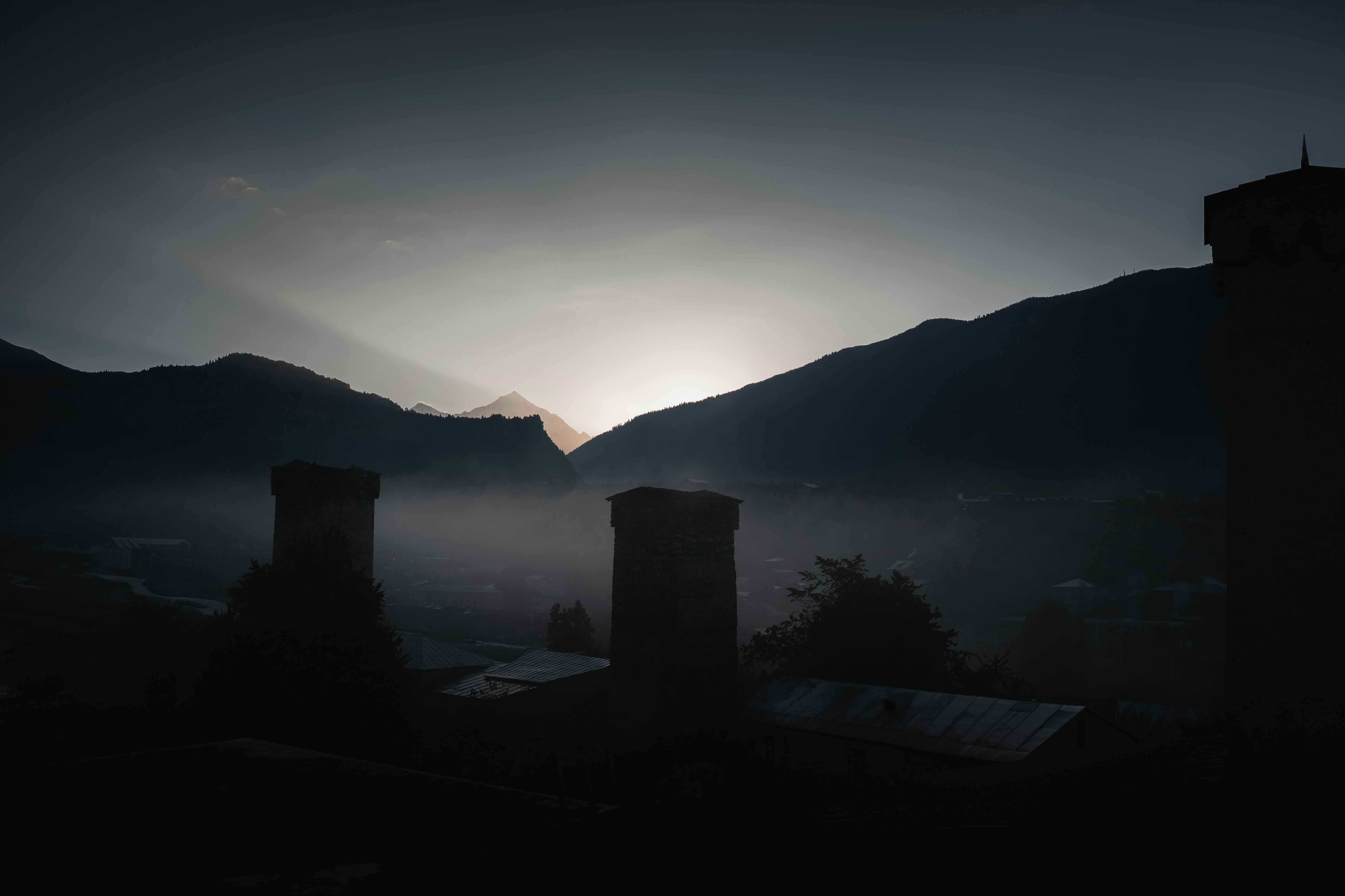 instagram: @auchynnikau | Sun rises over a misty mountain landscape.