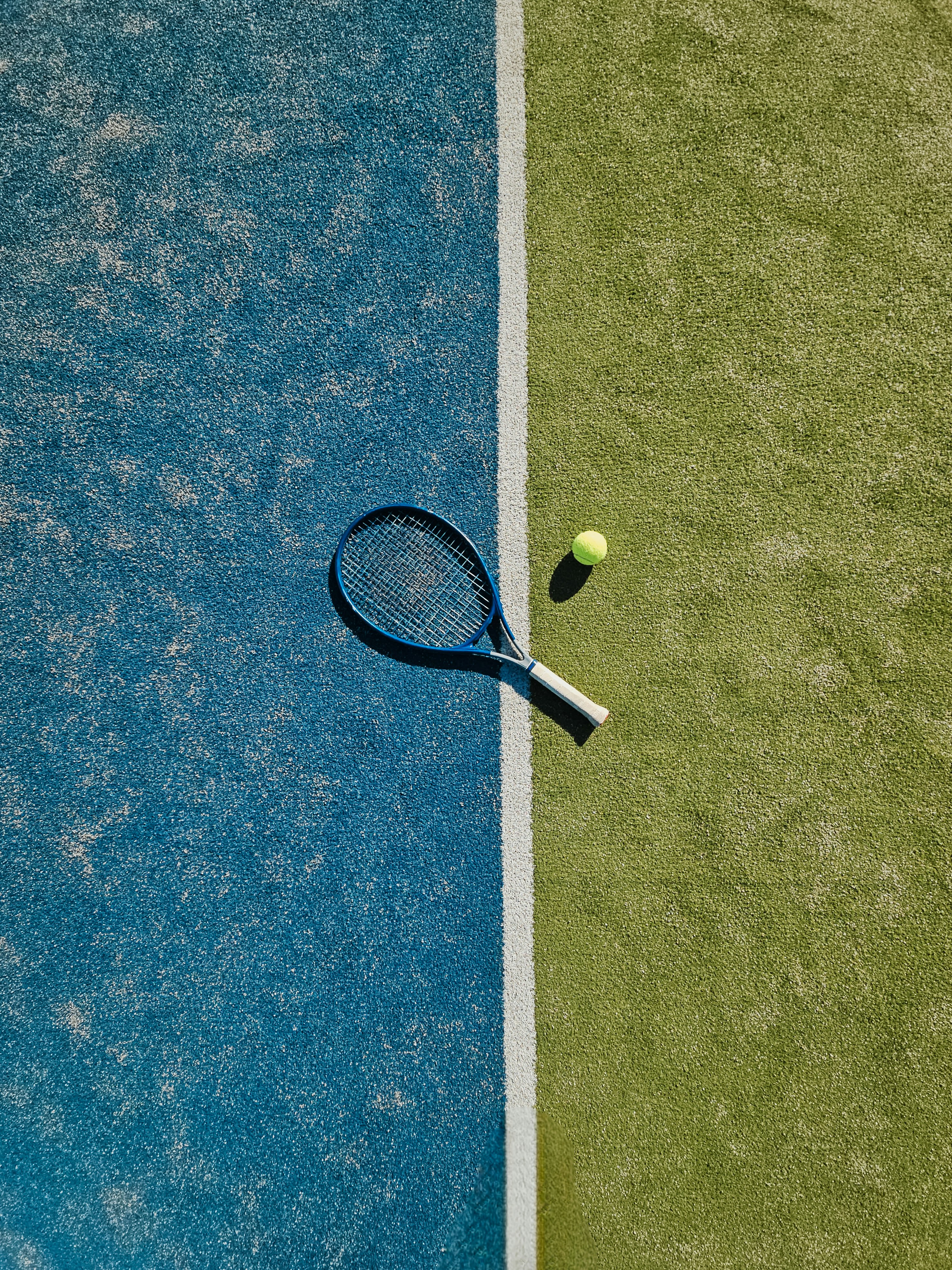A tennis racket and ball on the court. photo – Free Tennis Image on ...
