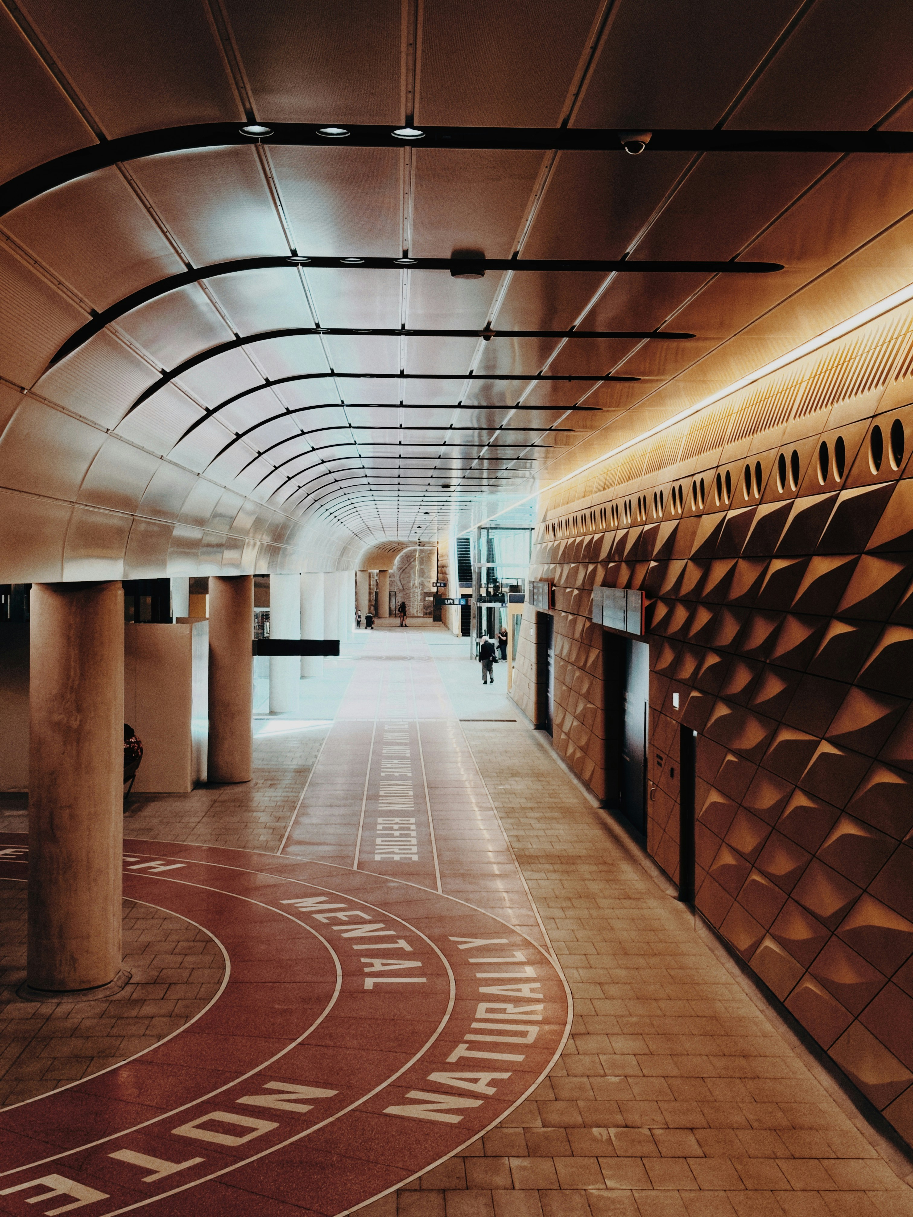 An architecturally interesting hallway with dramatic lighting. photo ...