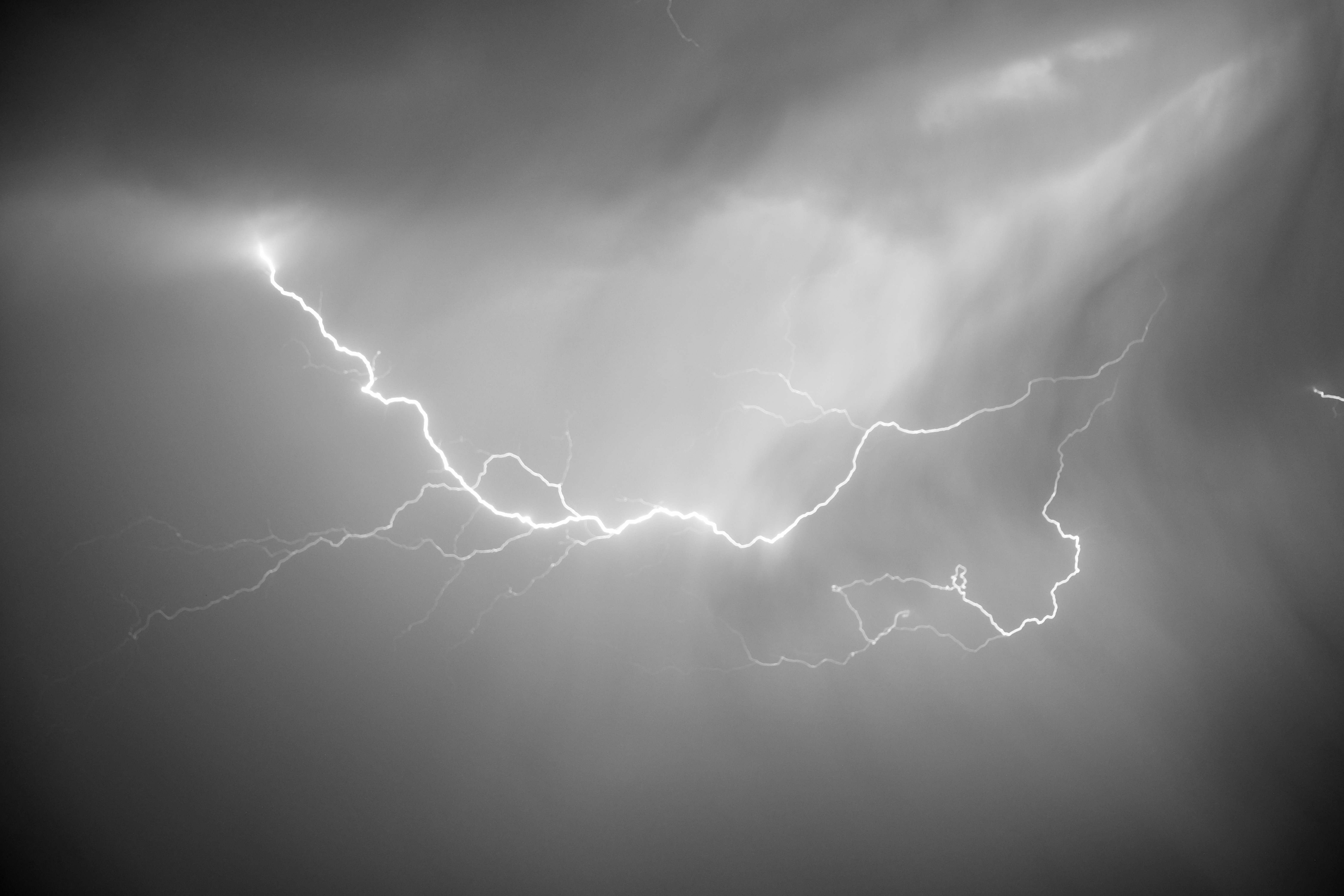 Lightning Thread Across a Storm-Washed Monochrome Sky