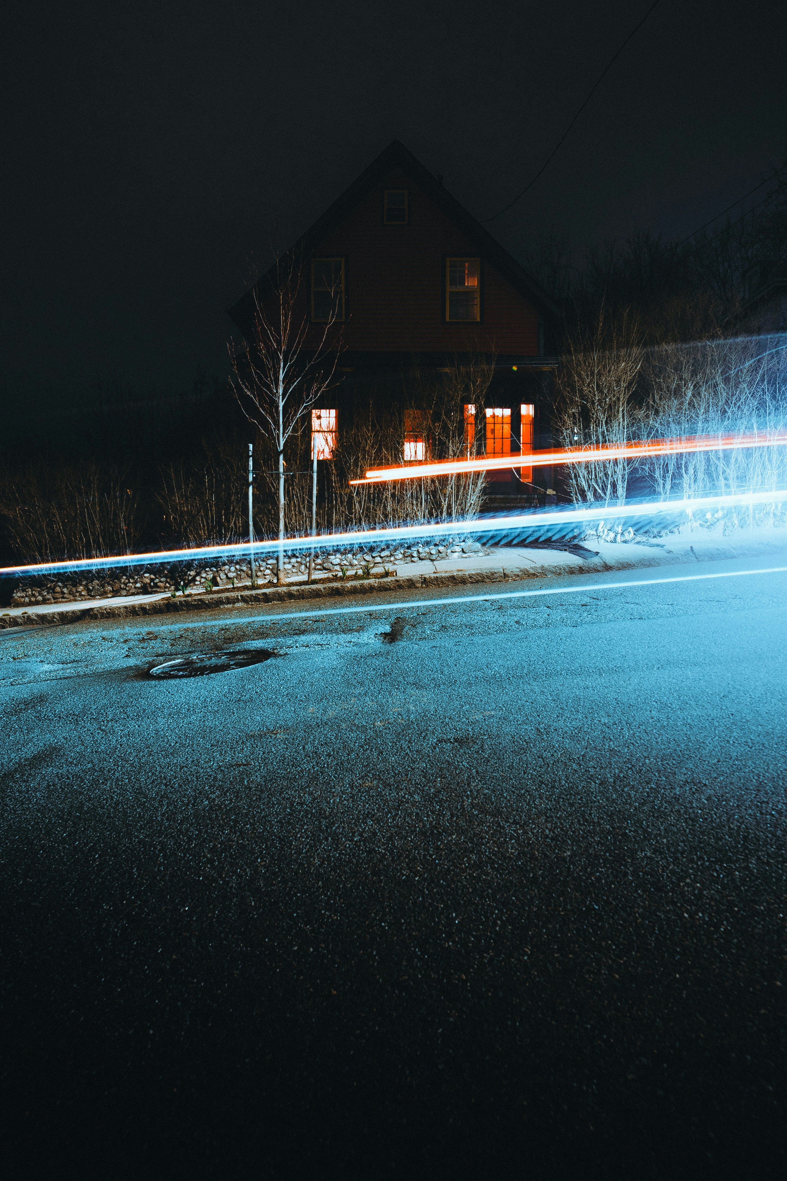 A dark road leads to a house at night. photo – Free Wallpaper Image on ...