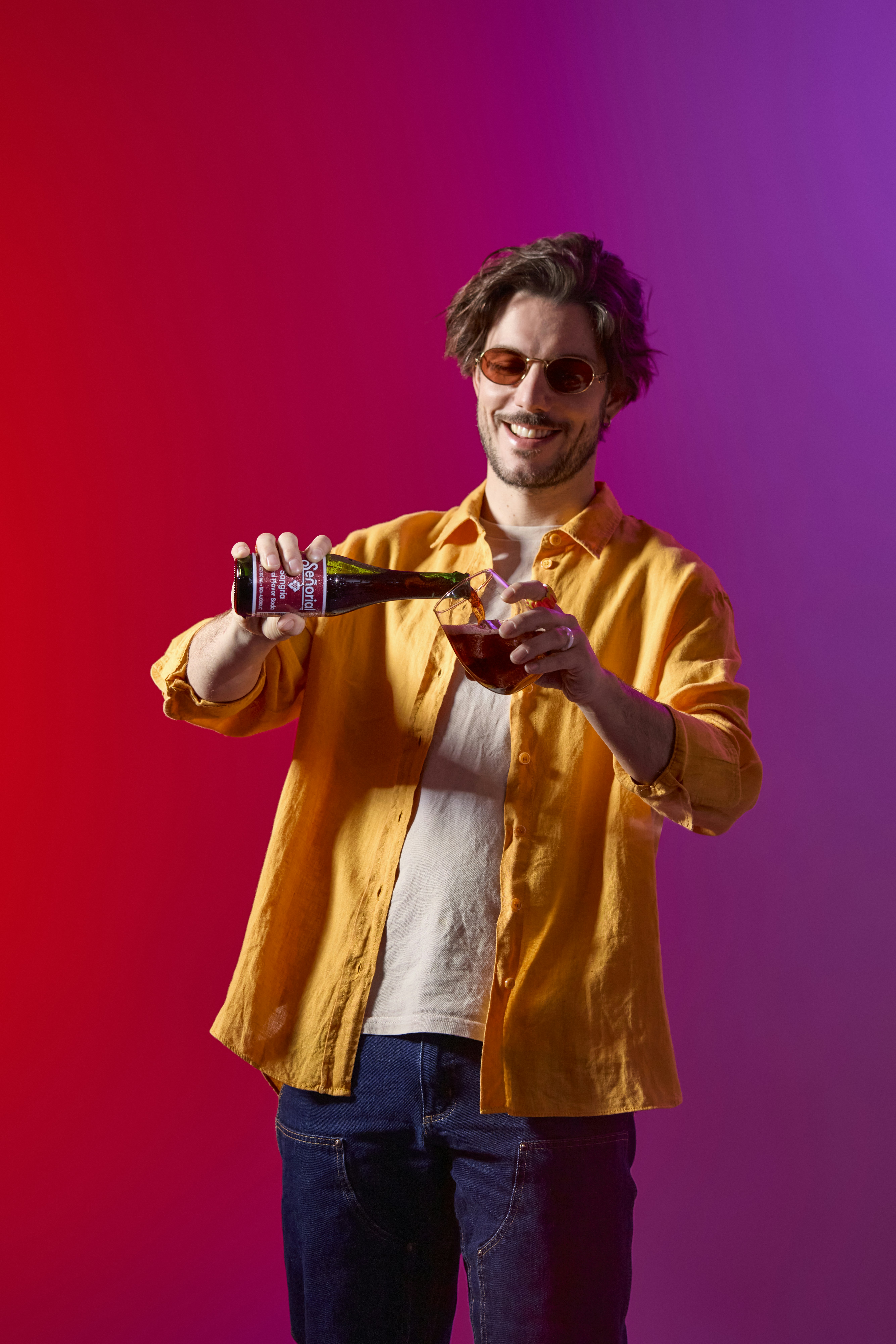 Neon Toast: Pouring a Spark of Color Against a Gradient Backdrop