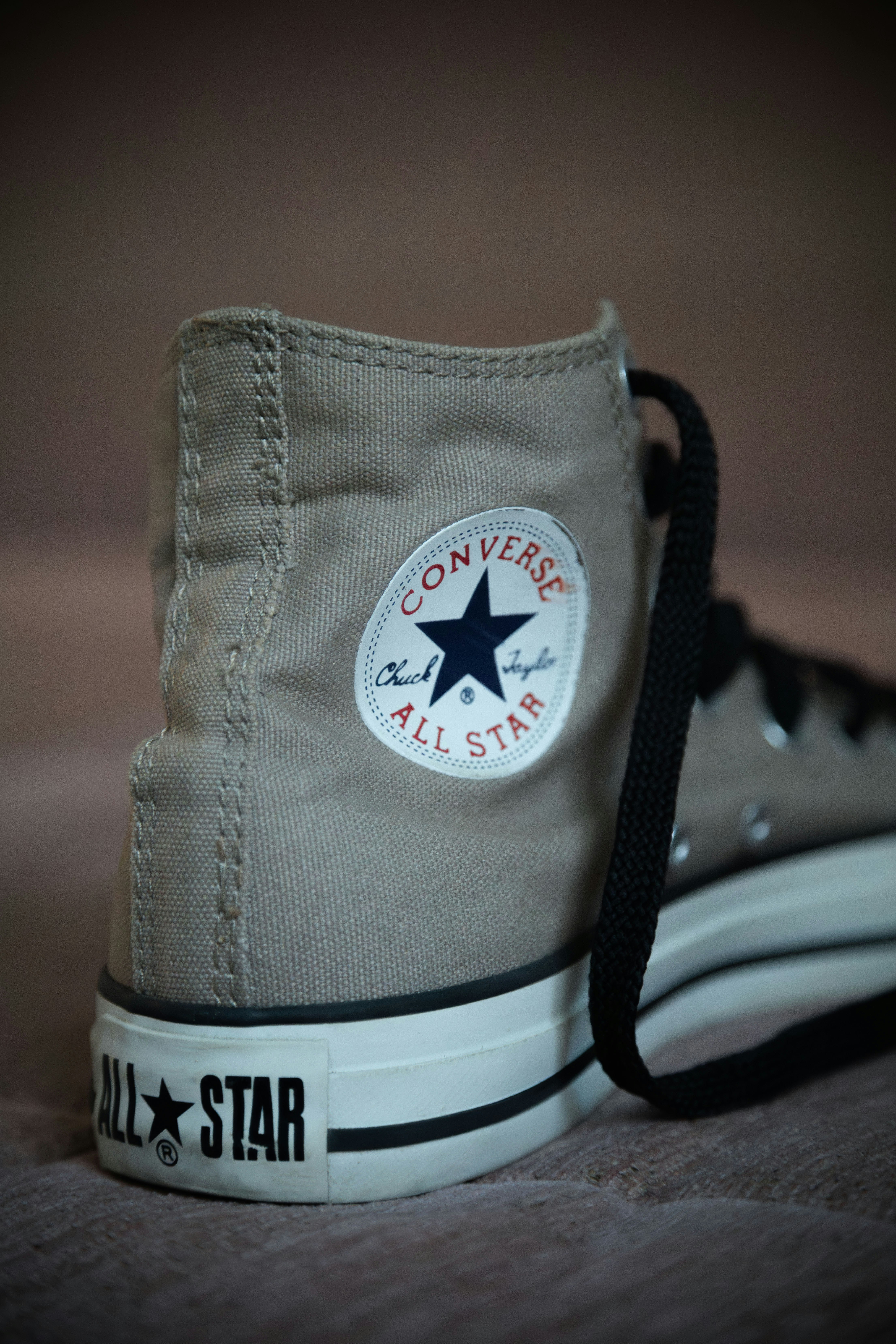 A close-up shot of a classic converse shoe.