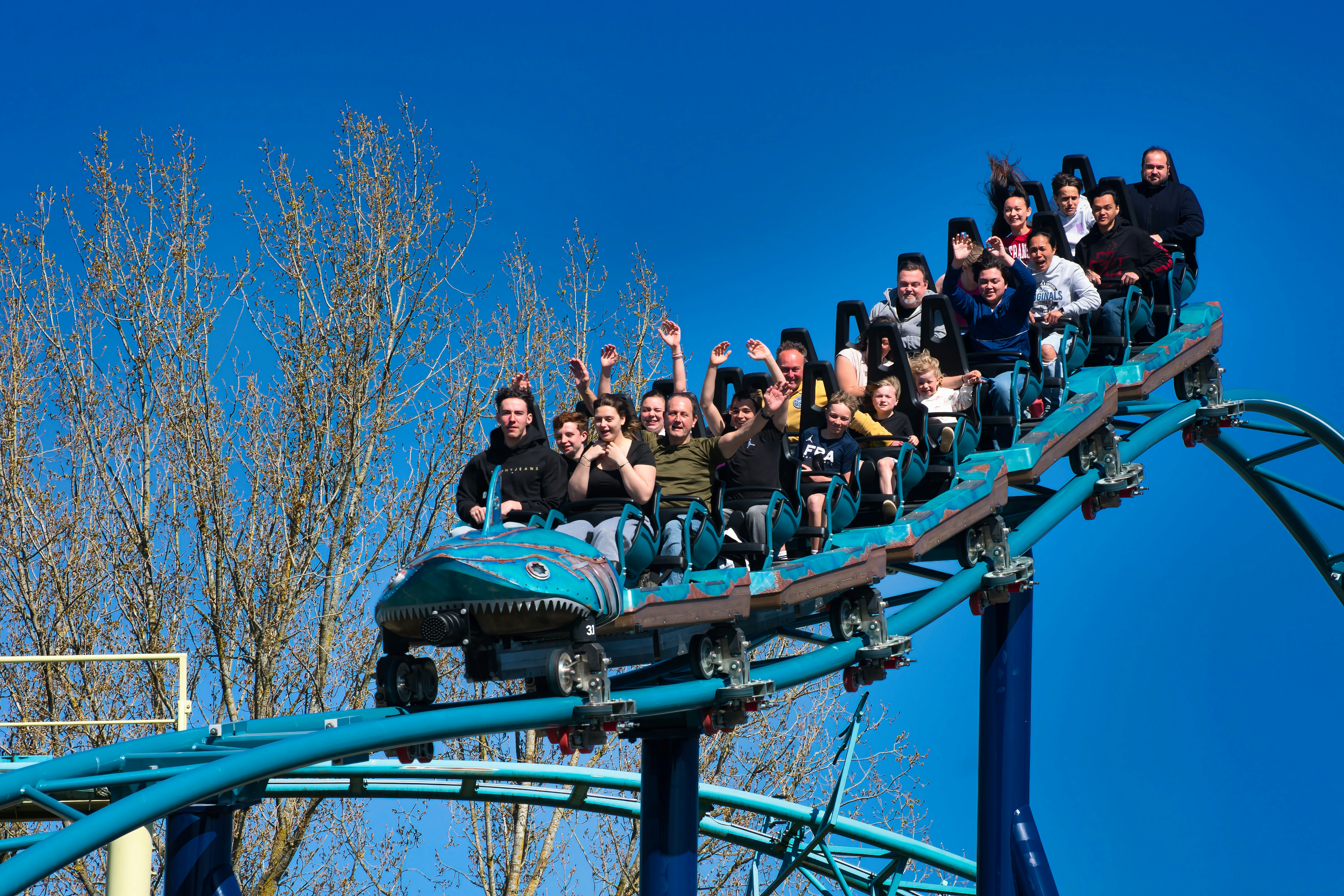People enjoy a thrilling ride on the roller coaster. photo – Free Image ...