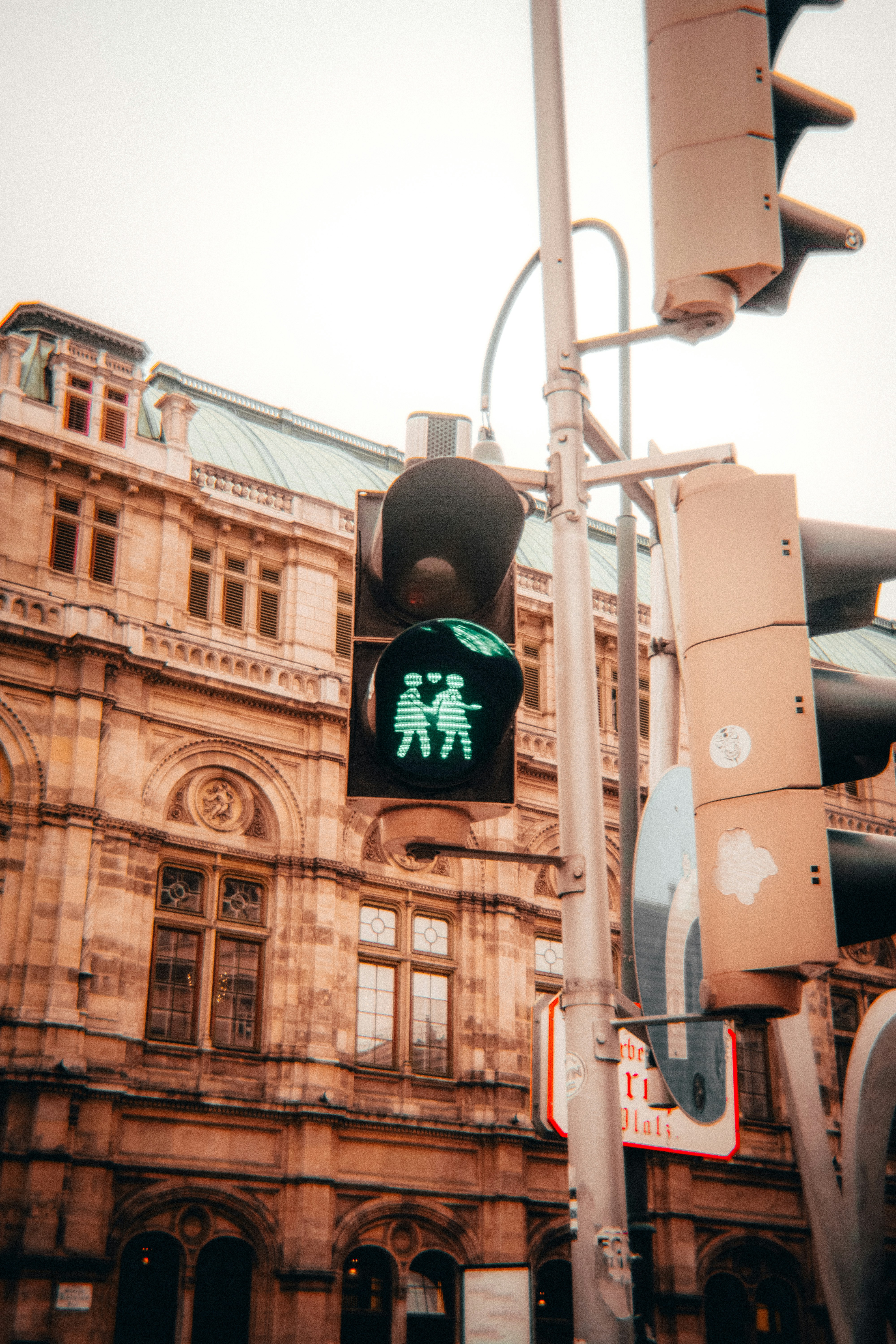 A traffic light with a special colorful bright design.