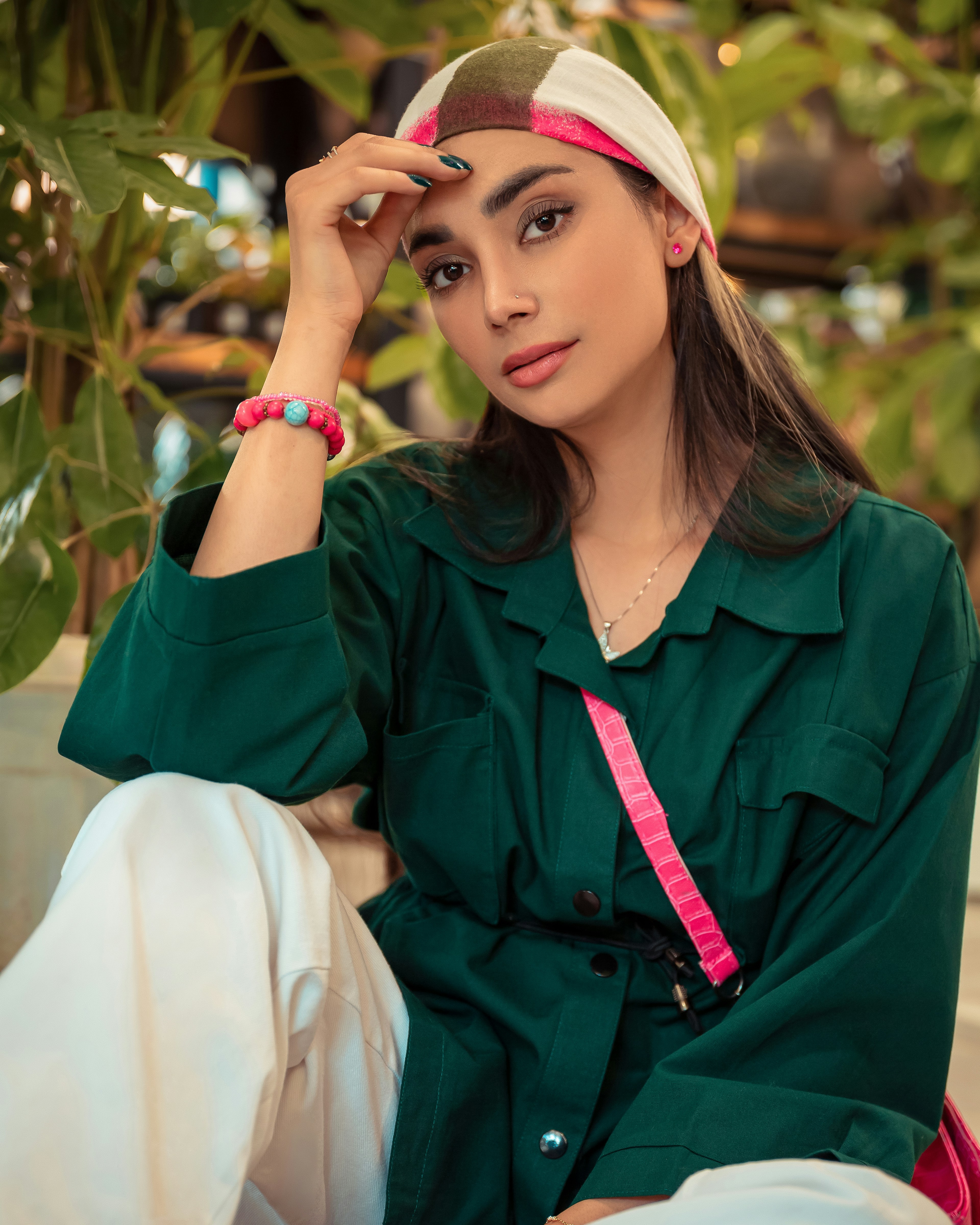 Emerald Hush: A Portrait Framed by Tropical Greens