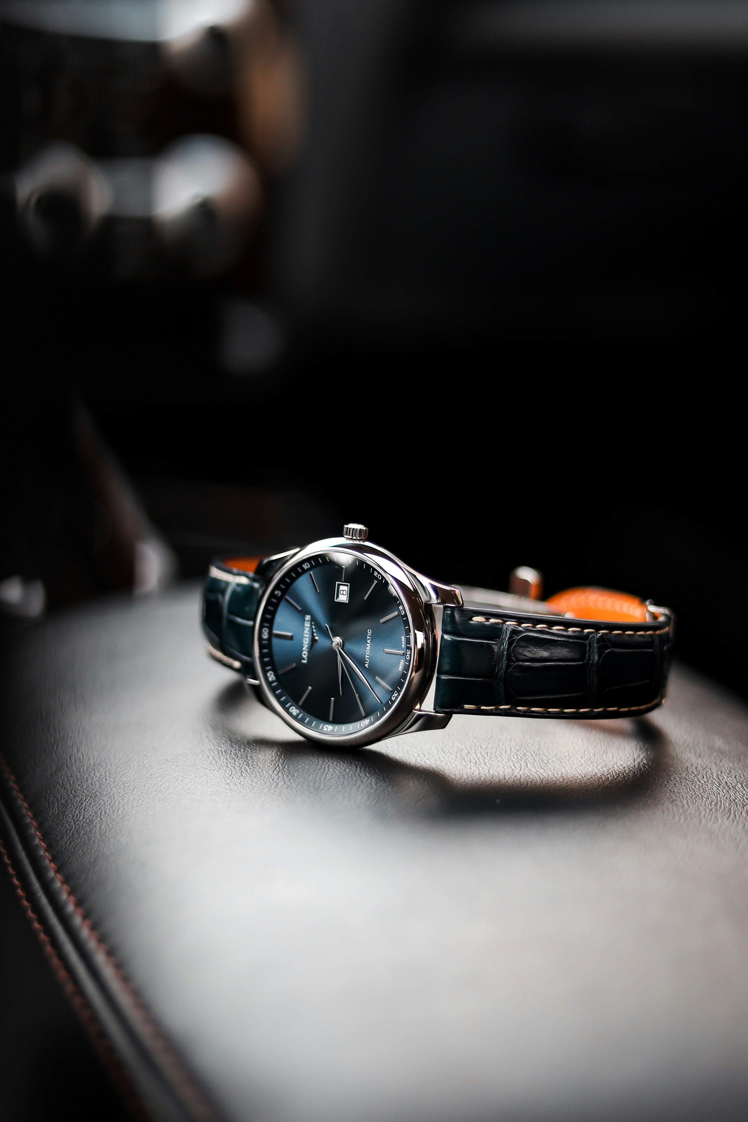 A stylish watch with a blue face. photo – Free Saudi arabia Image on ...