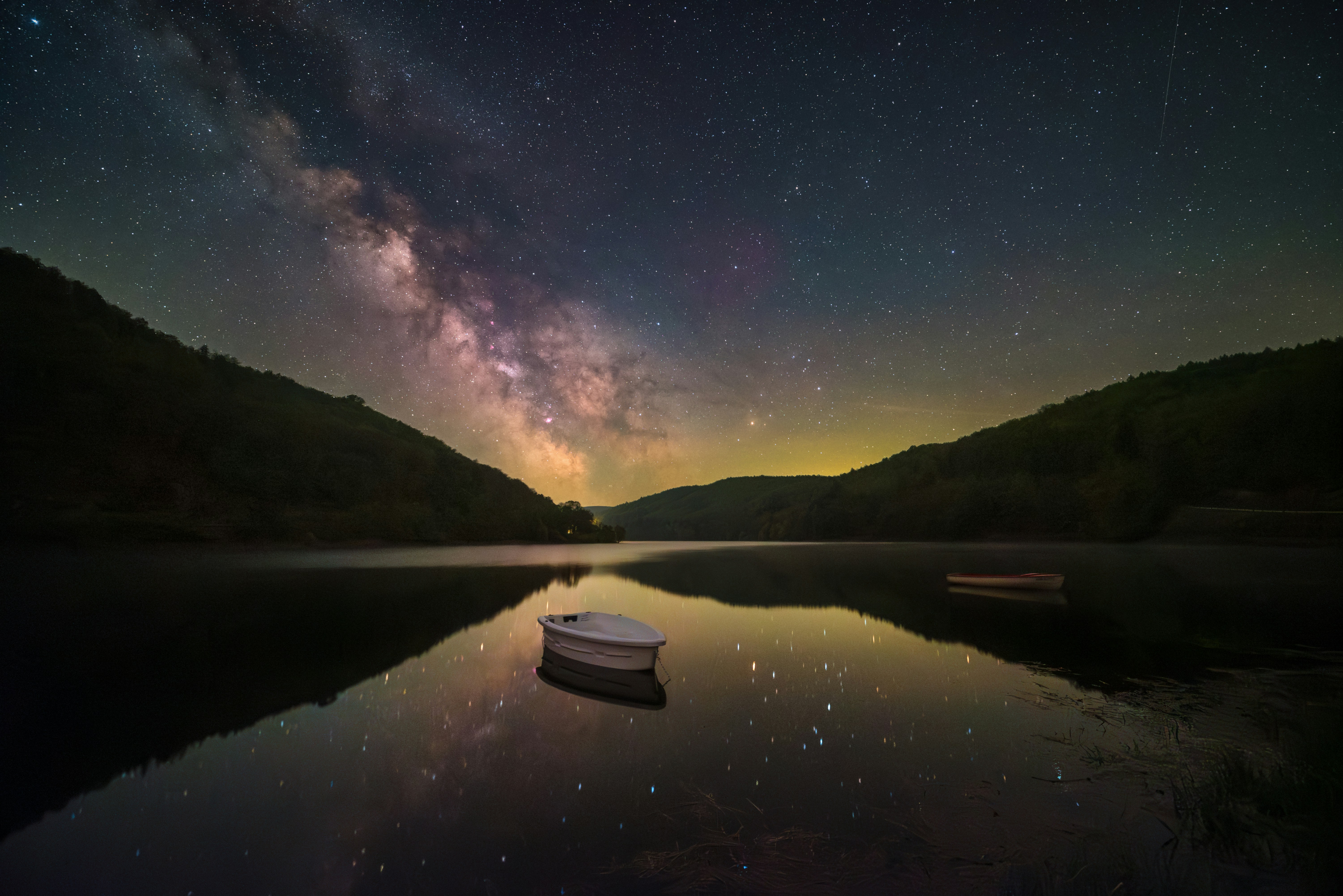 Milky way and boats reflected in serene water. photo – Free Wallpaper ...