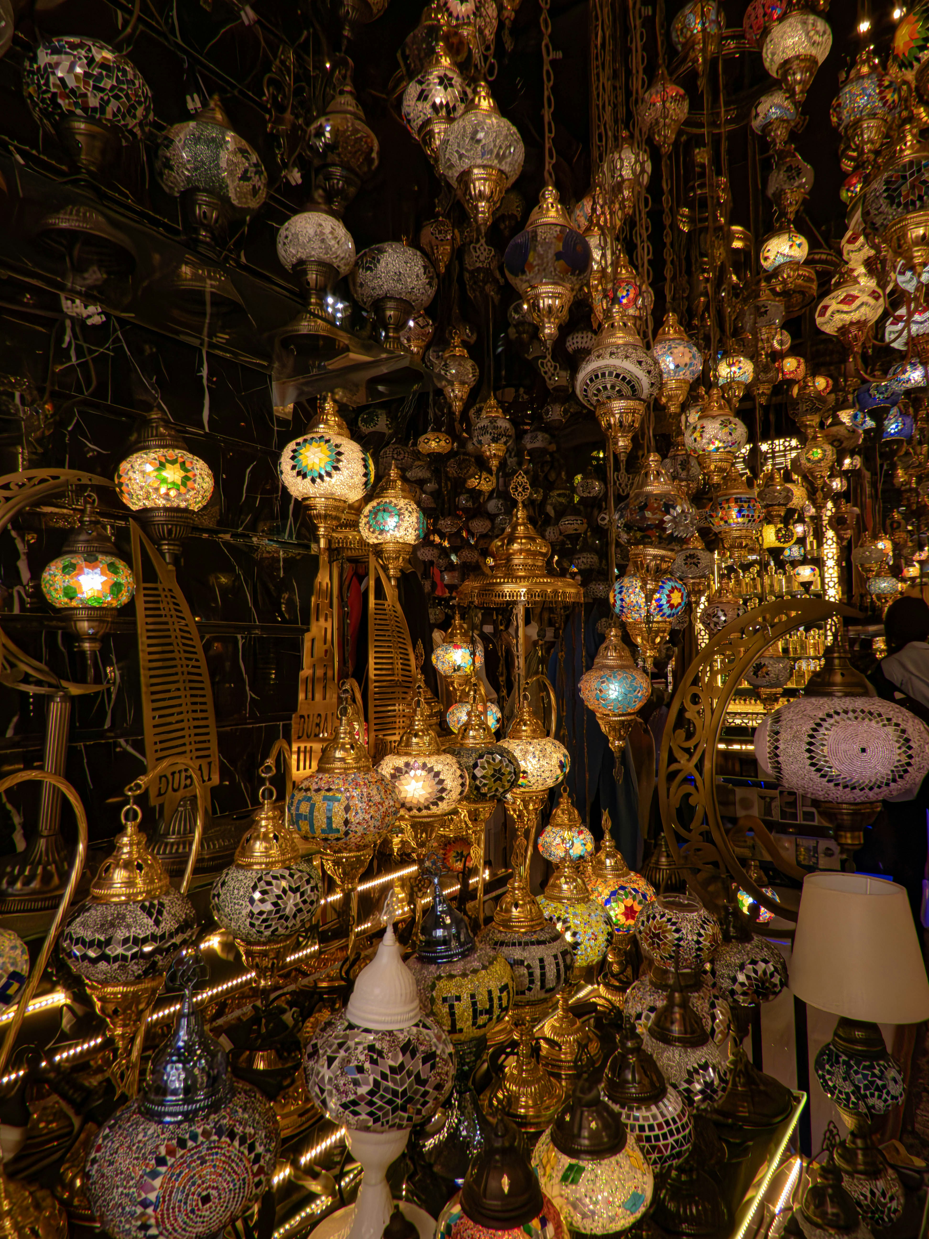 Many intricate lamps hang beautifully. photo – Free Aesthetic Image on ...