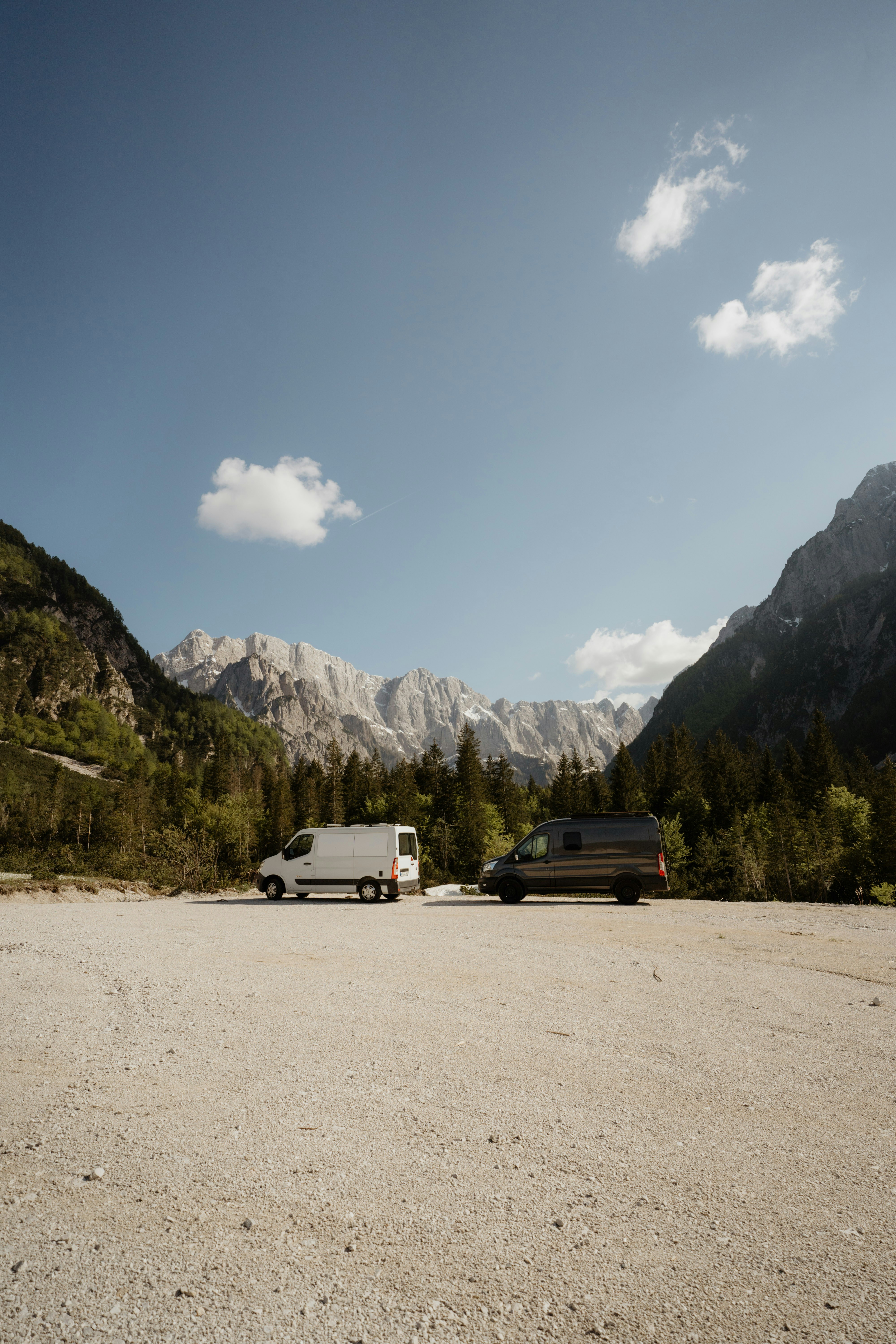 Two vans parked with mountains in the background. photo – Free Car ...