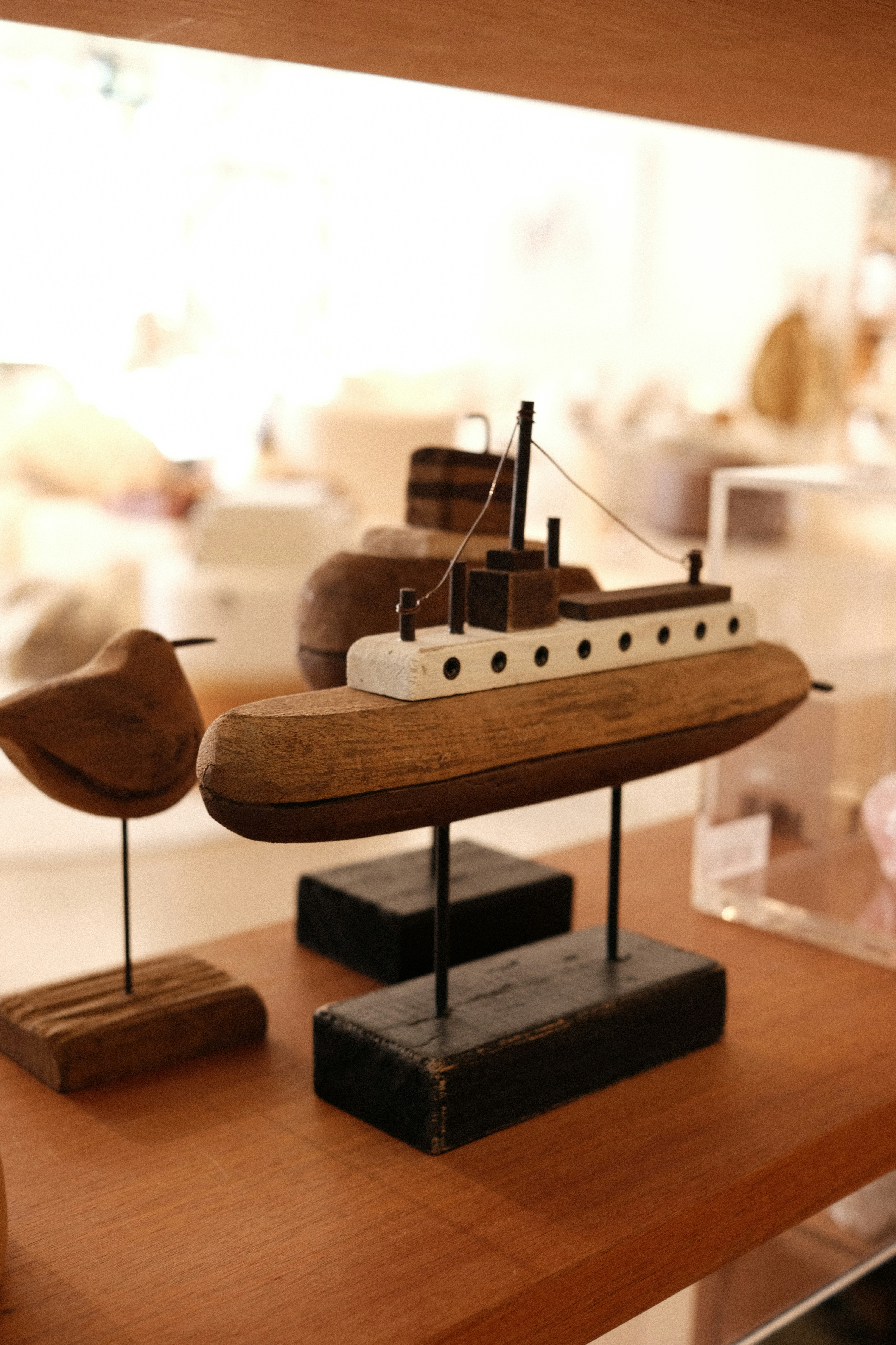 Miniature Ocean Liner on a Wooden Stage