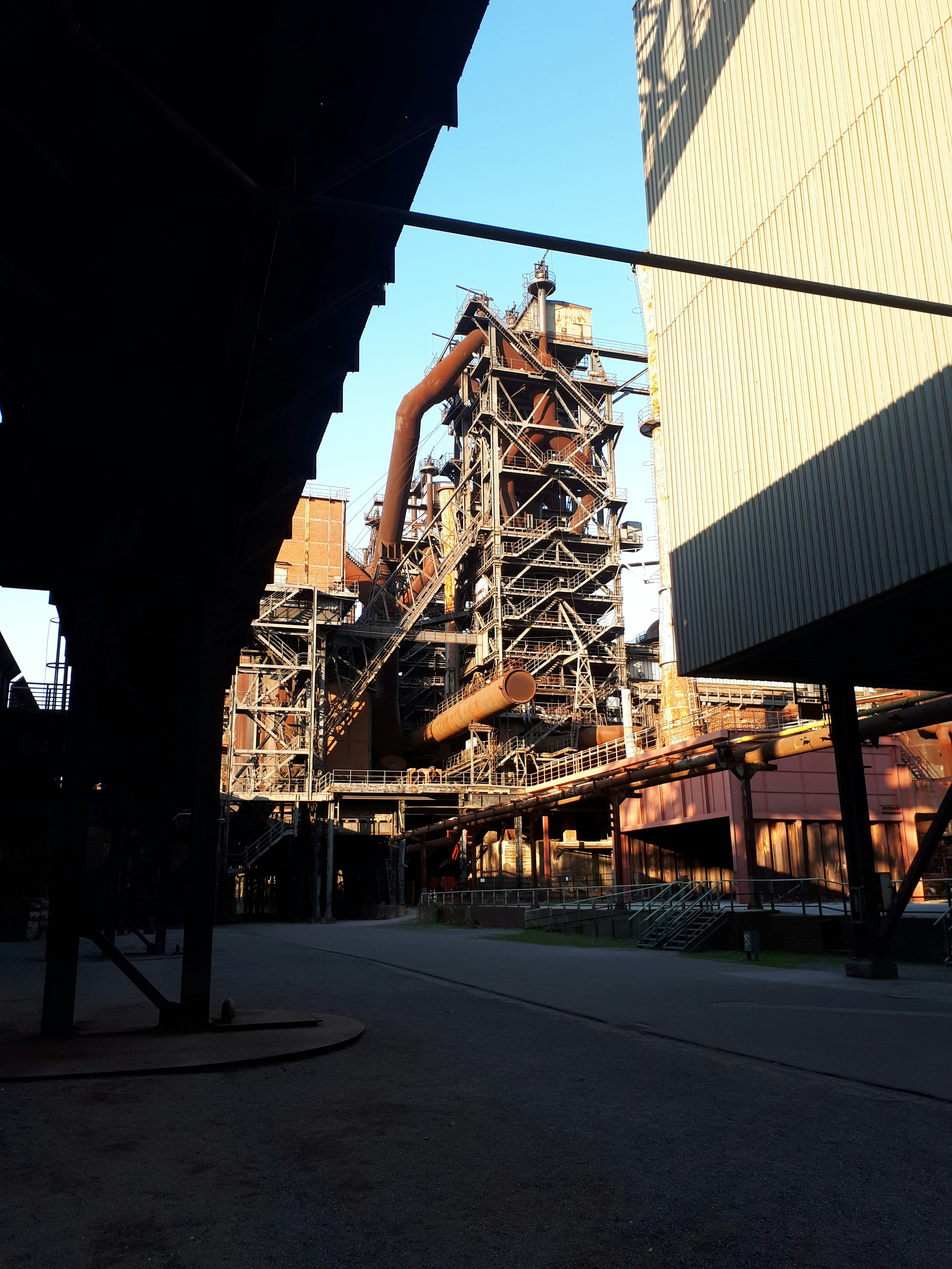 Rust Cathedral of Iron Under a Clear Sky