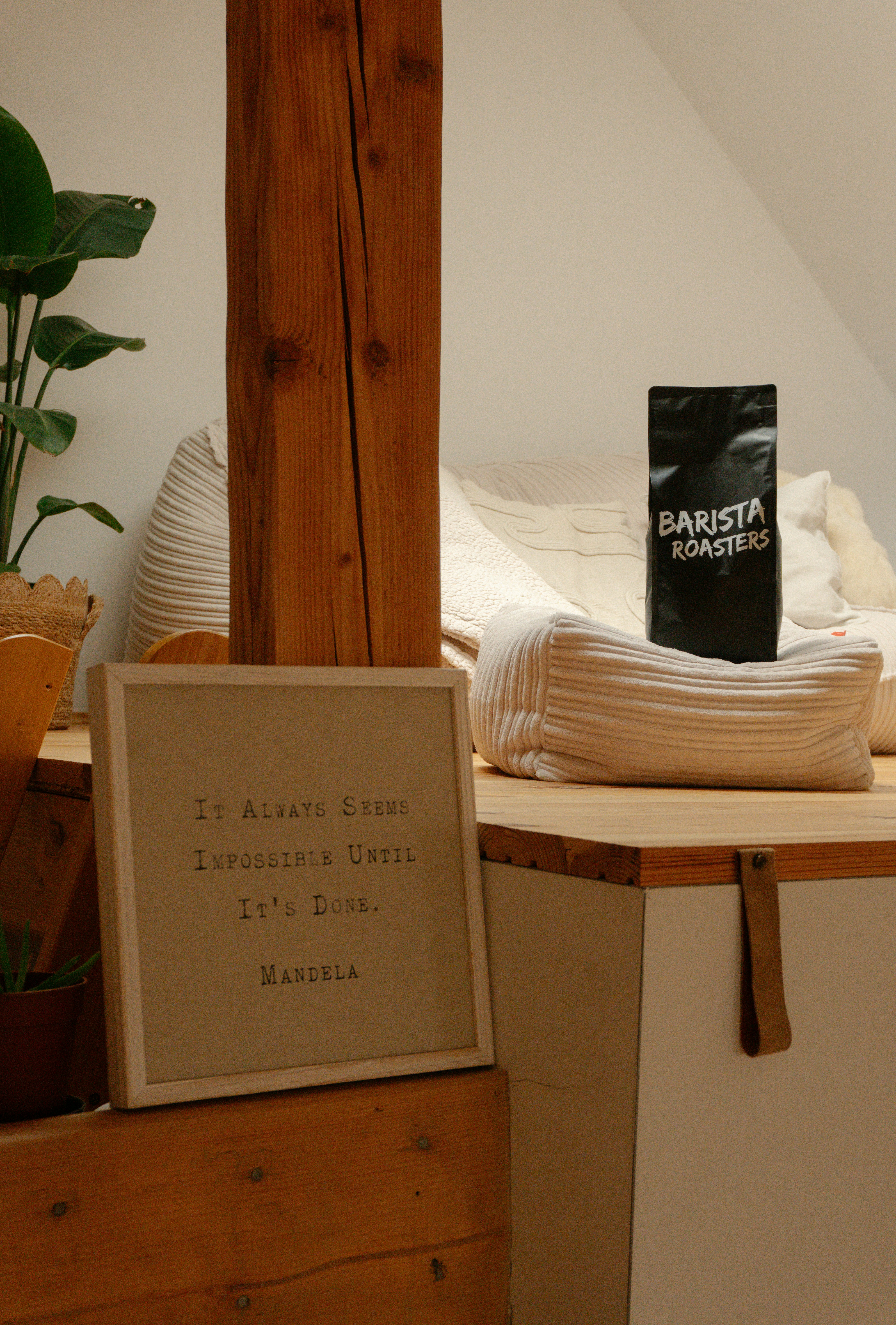 Cozy Corner with Wooden Beam and Motivational Quote