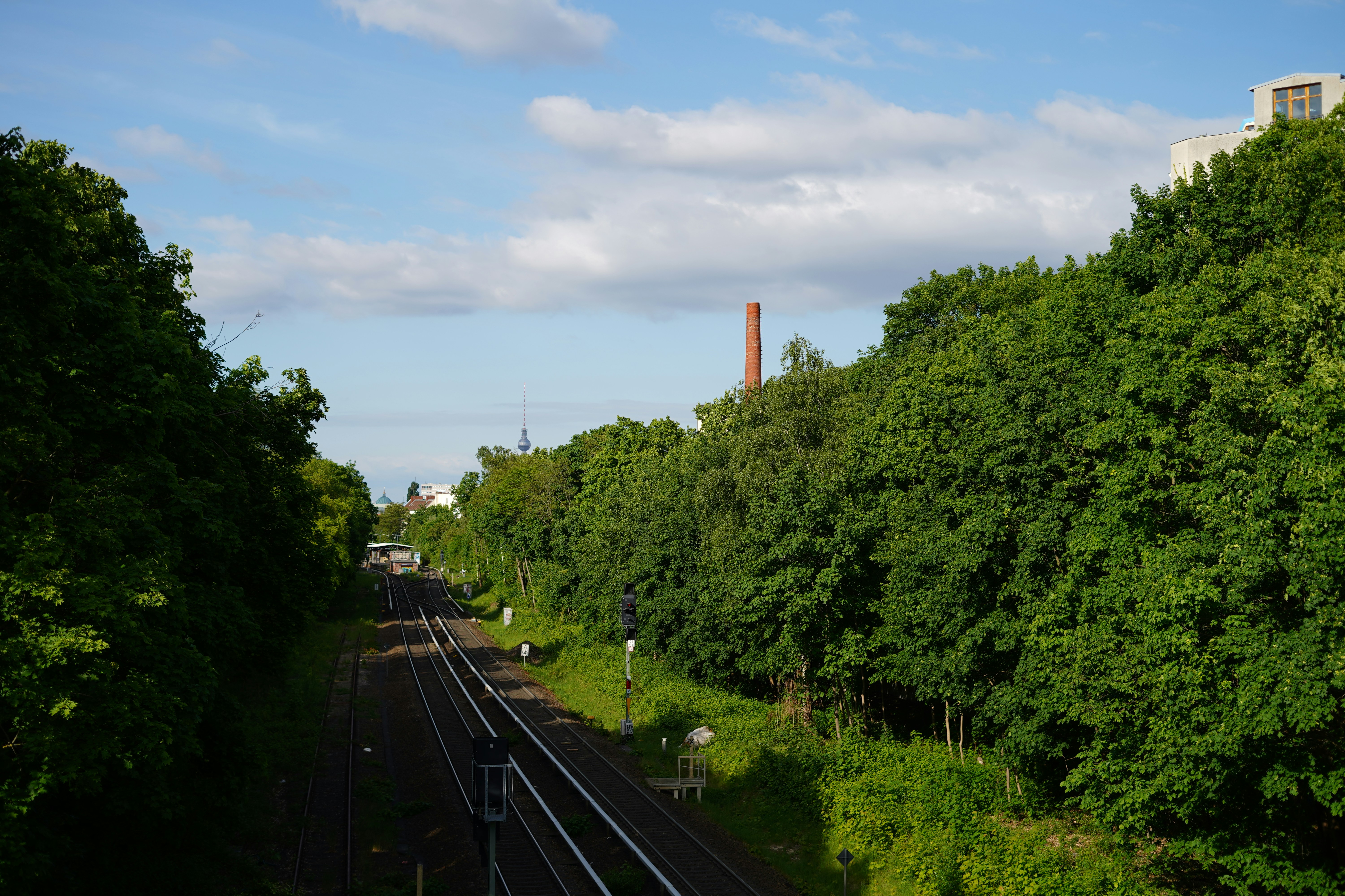  rails toward the city horizon