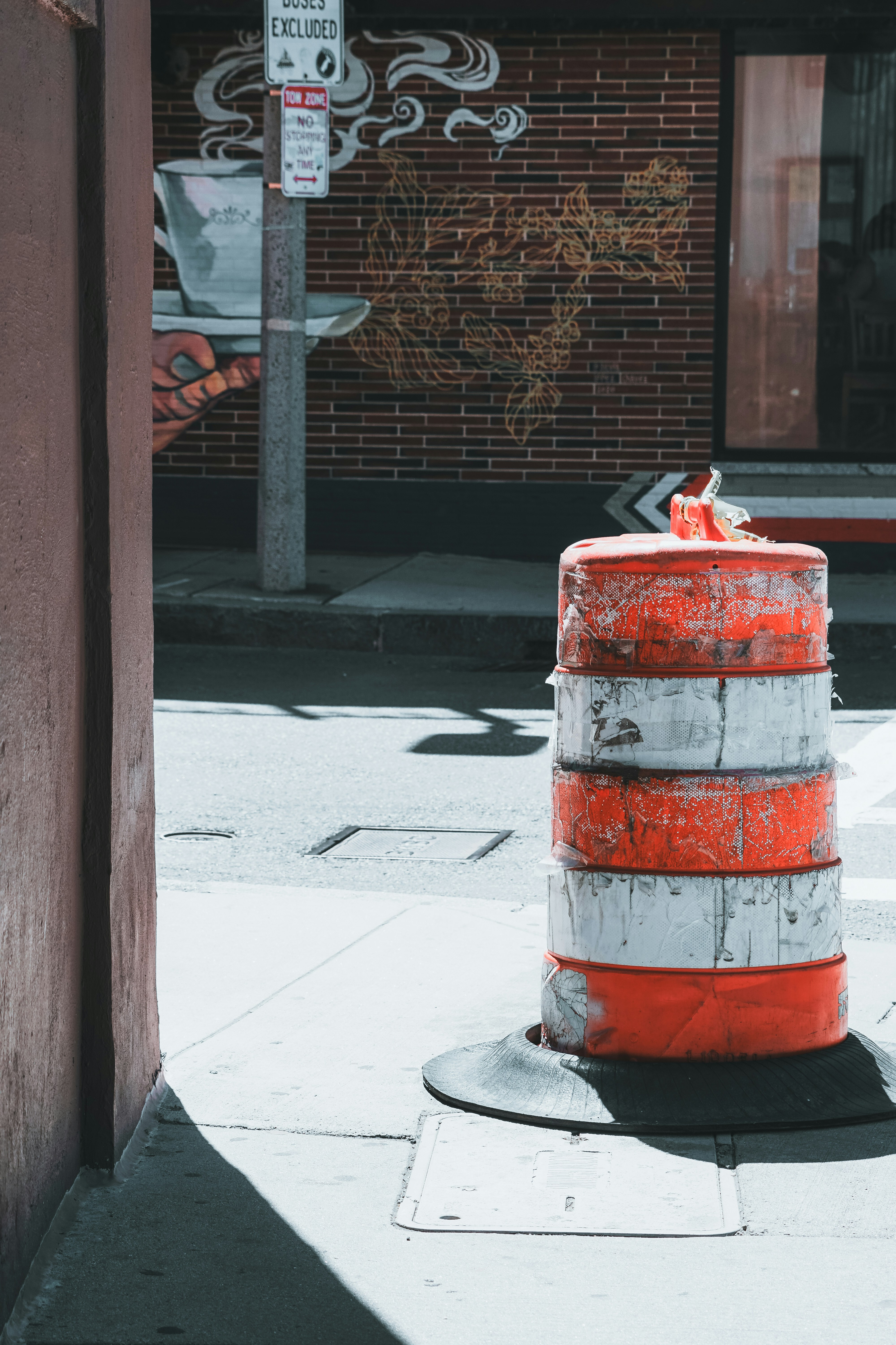 Crimson Barrier by the Brick Wall: A City Street Study