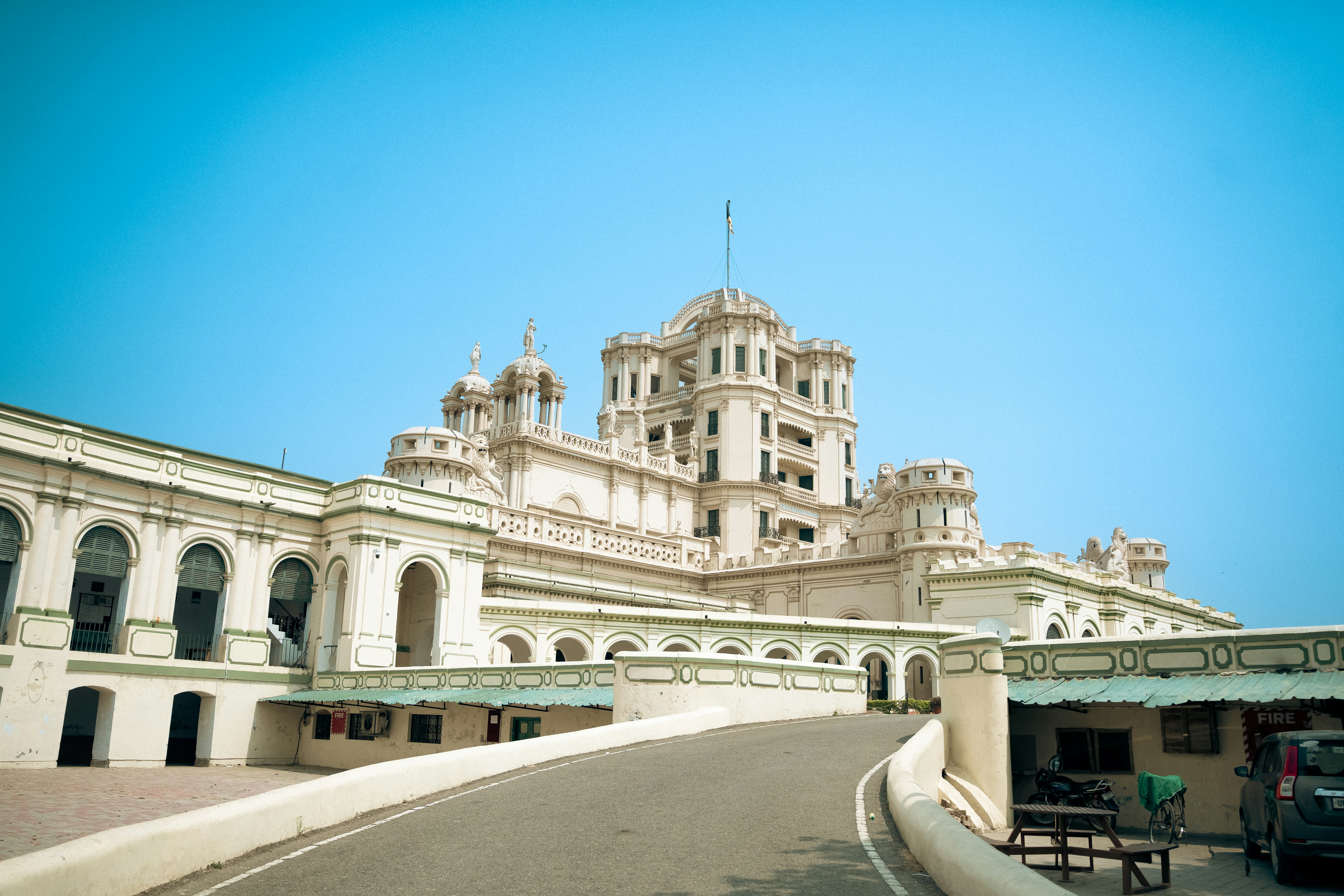 Ivory Fortress on the Hill: Sunlit Domes Crown the Curving Road