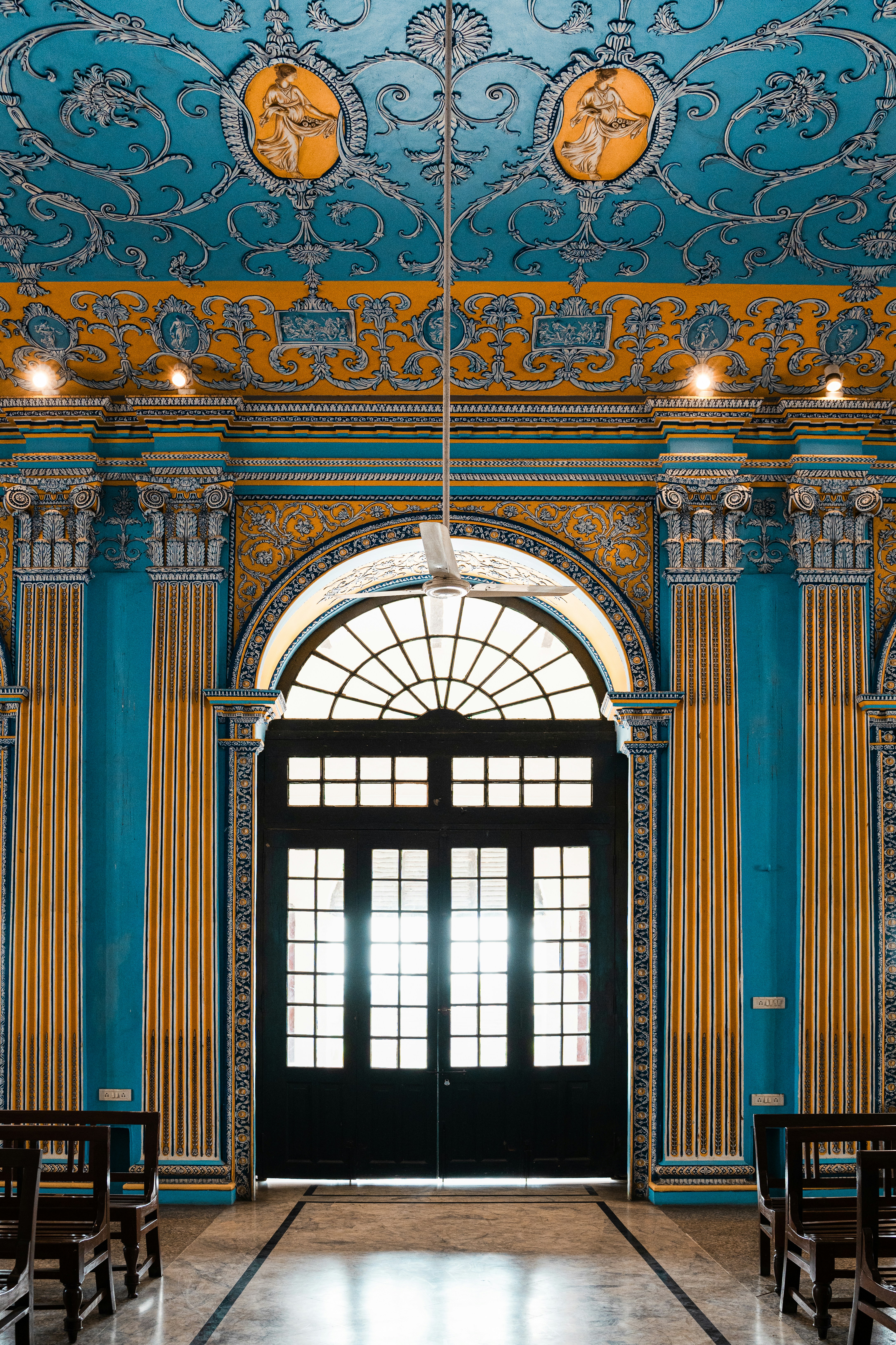Cerulean Baroque Portal: Central Door Framed by Gold and Teal