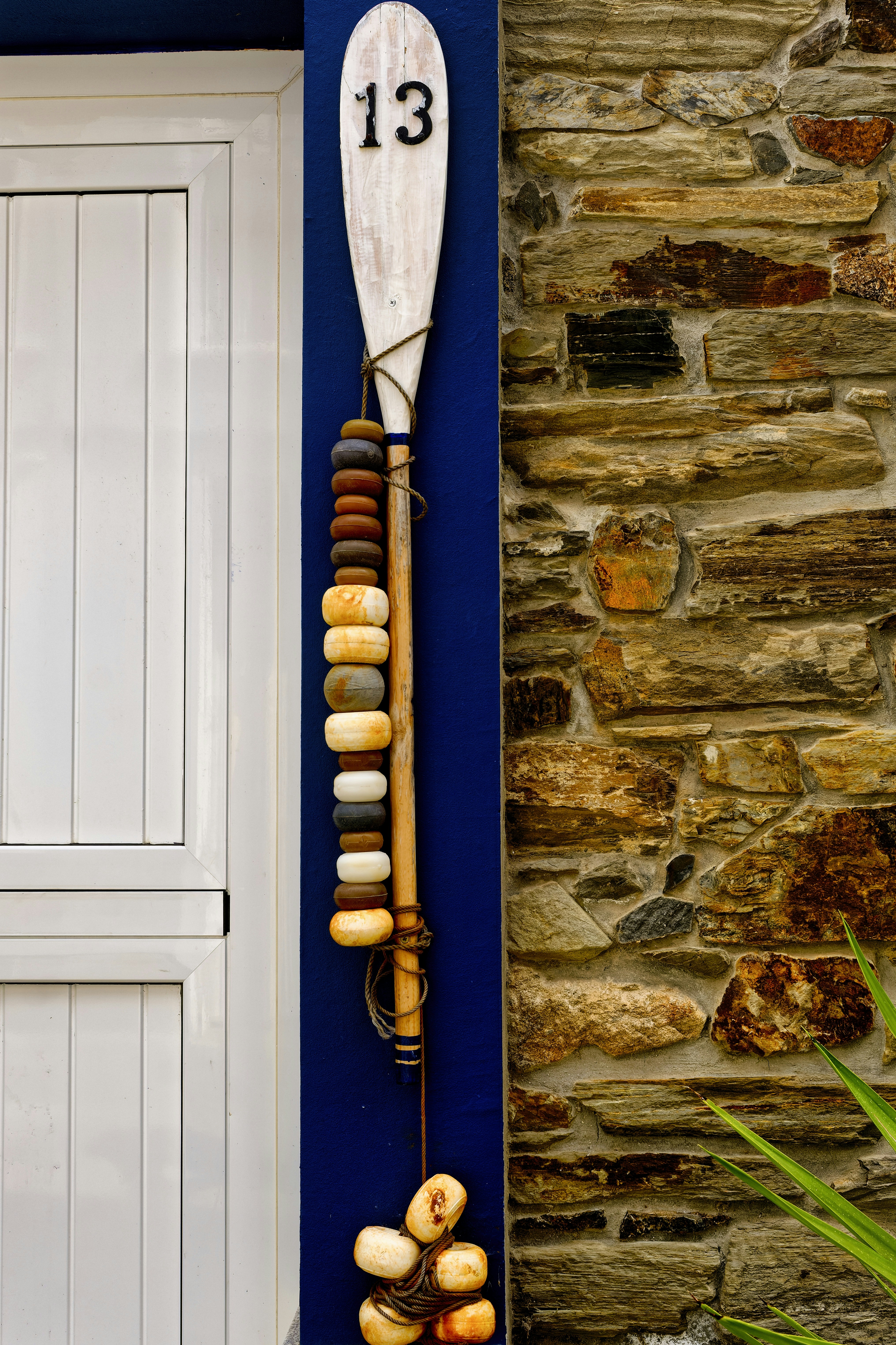 A decorative oar with house number thirteen. photo – Free Creativity ...