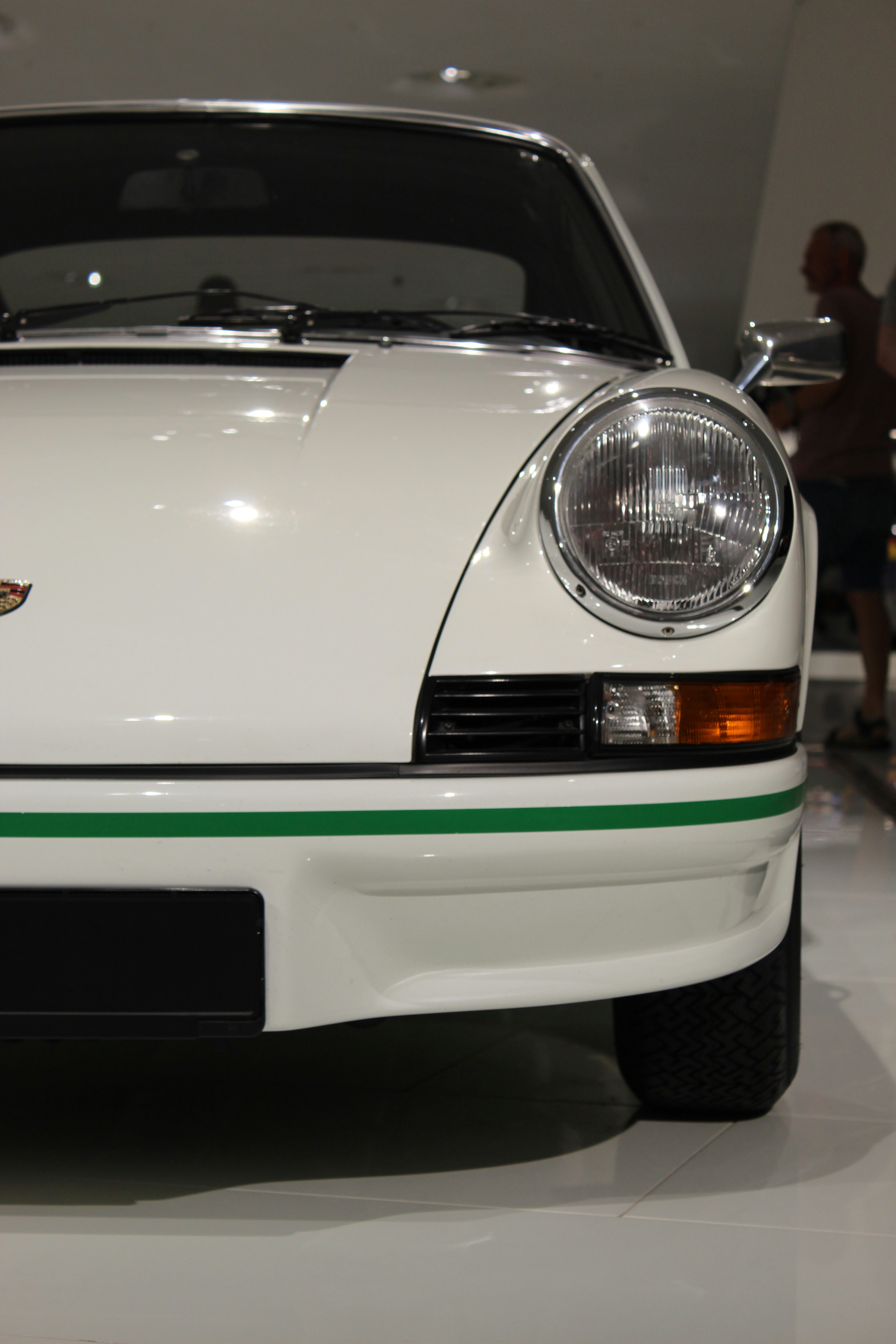 A classic white porsche's front end is featured. photo – Free Porsche ...