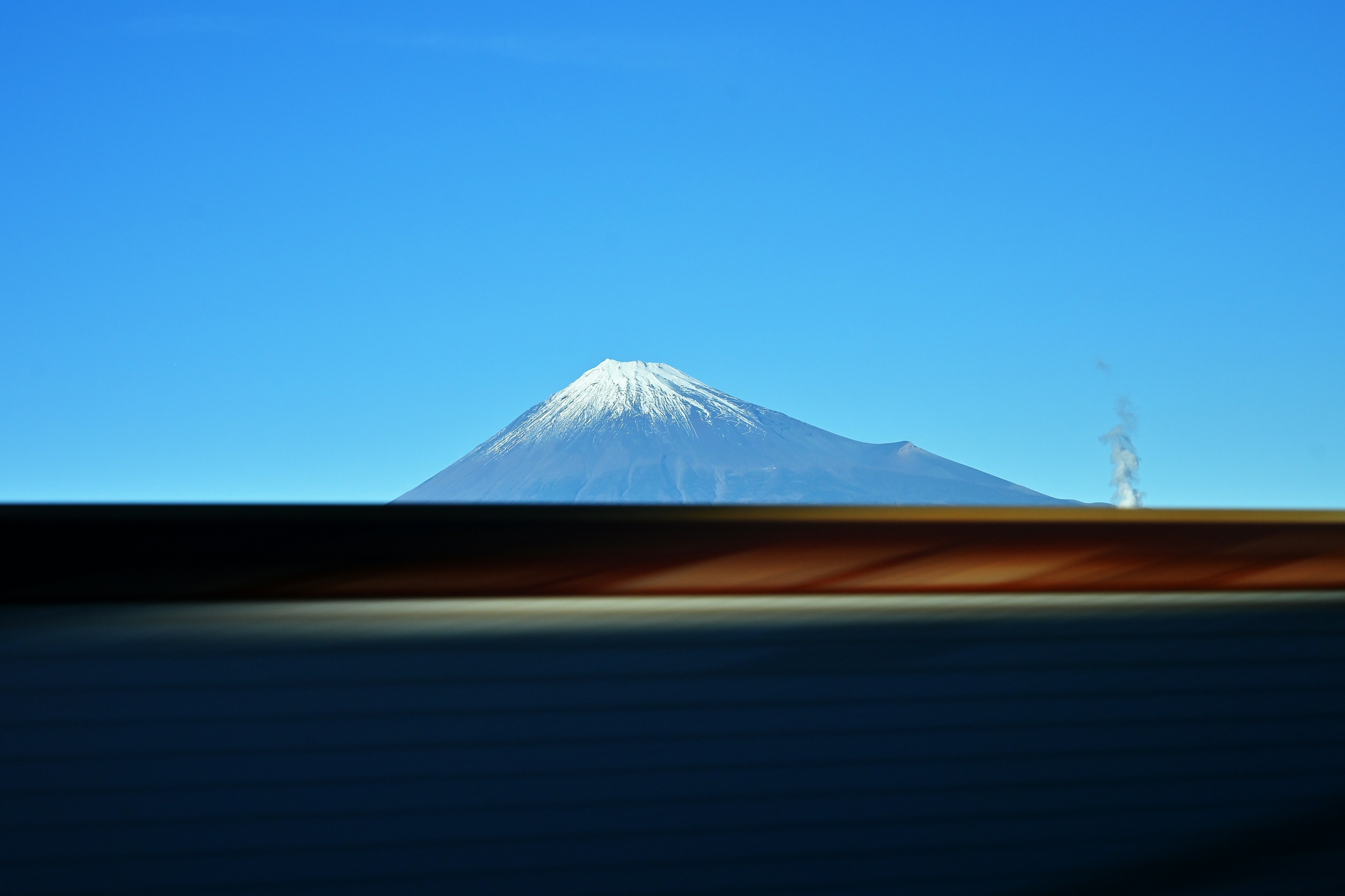 Fuji at Speed: Snow Peak Framed by a Streaked Foreground