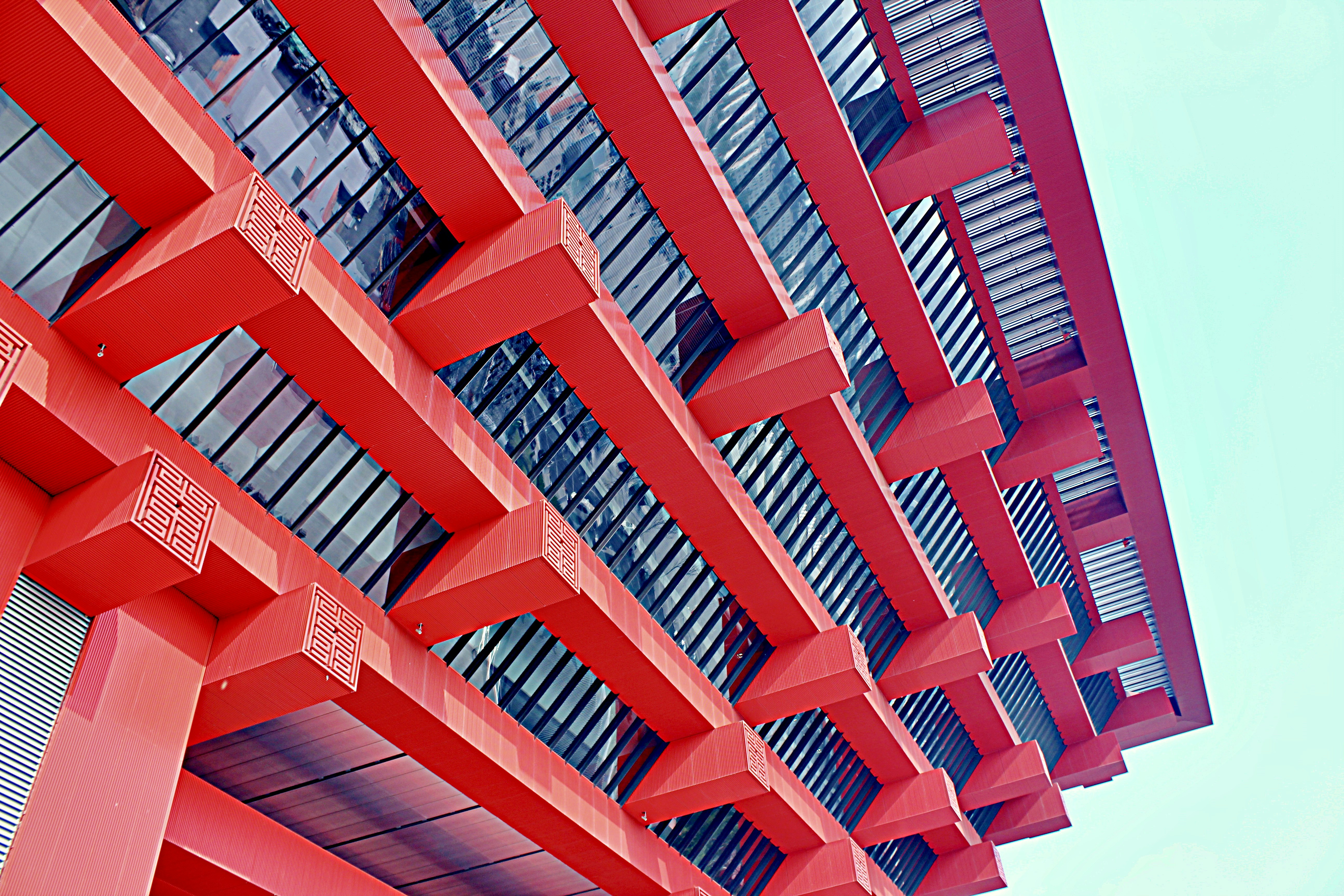 Crimson Lattice: A Bold Architectural Grid Reaching for the Sky