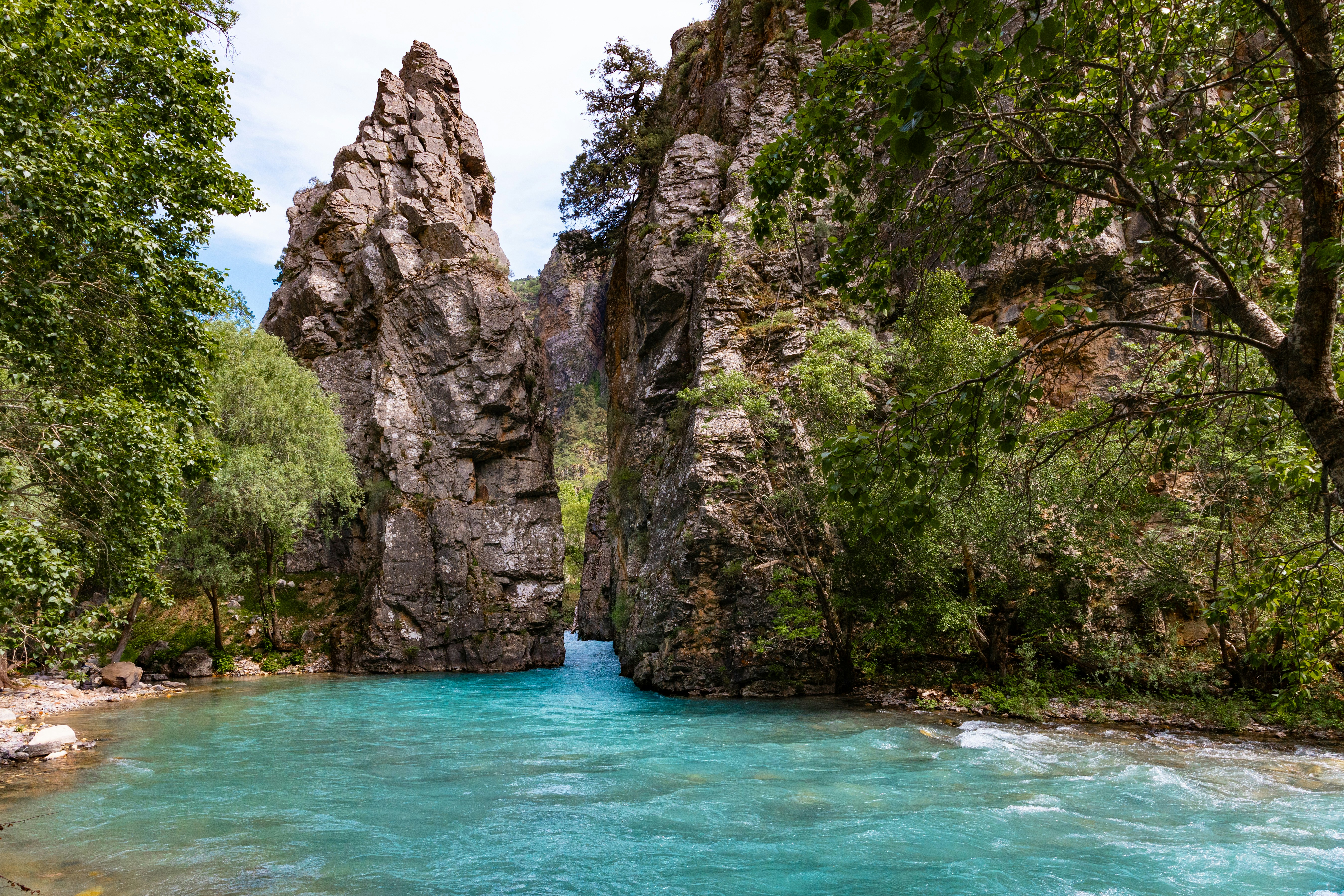 Turquoise Gorge Between Twin Pillars