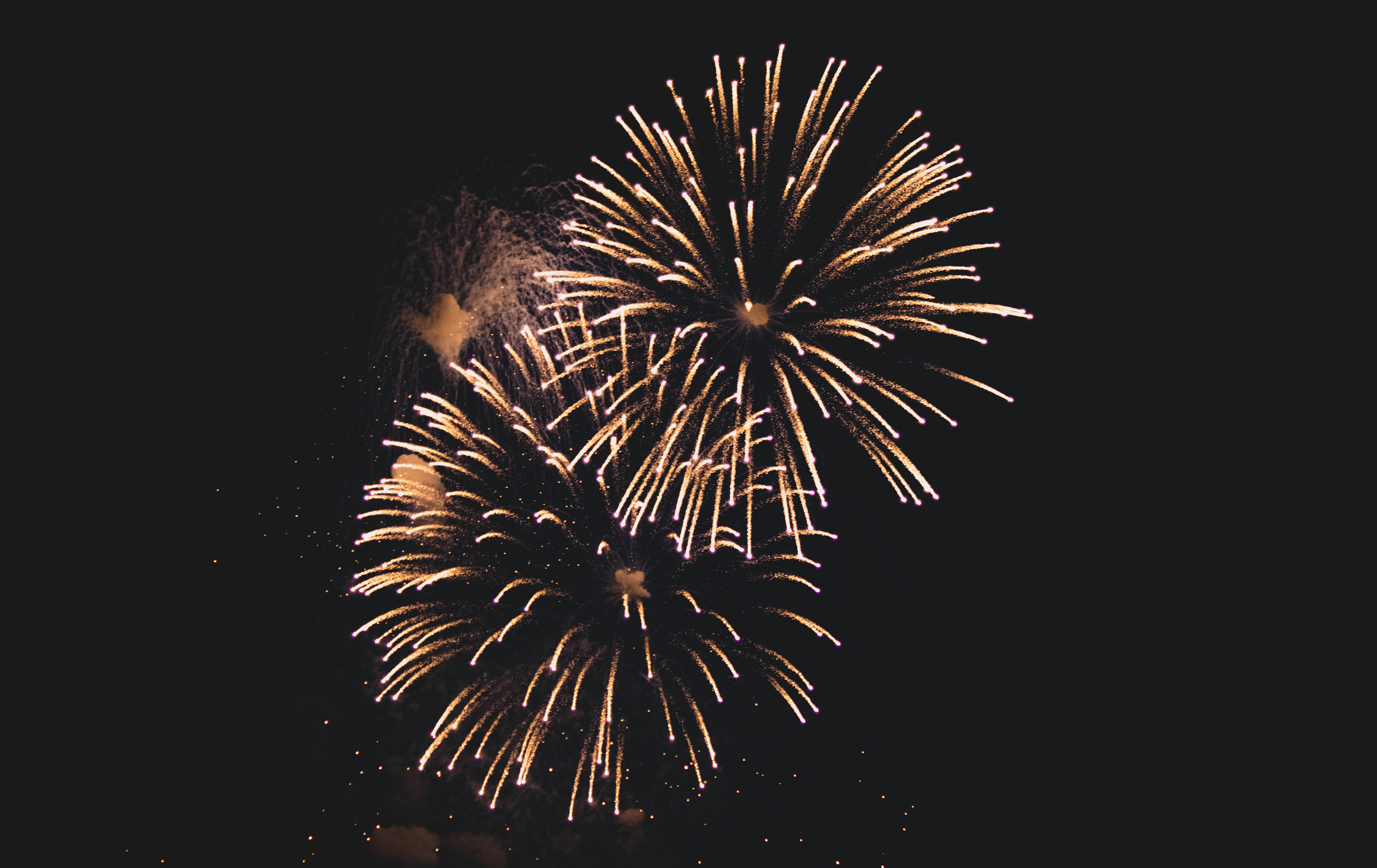 Twin Golden Bursts Illuminate the Velvet Night.