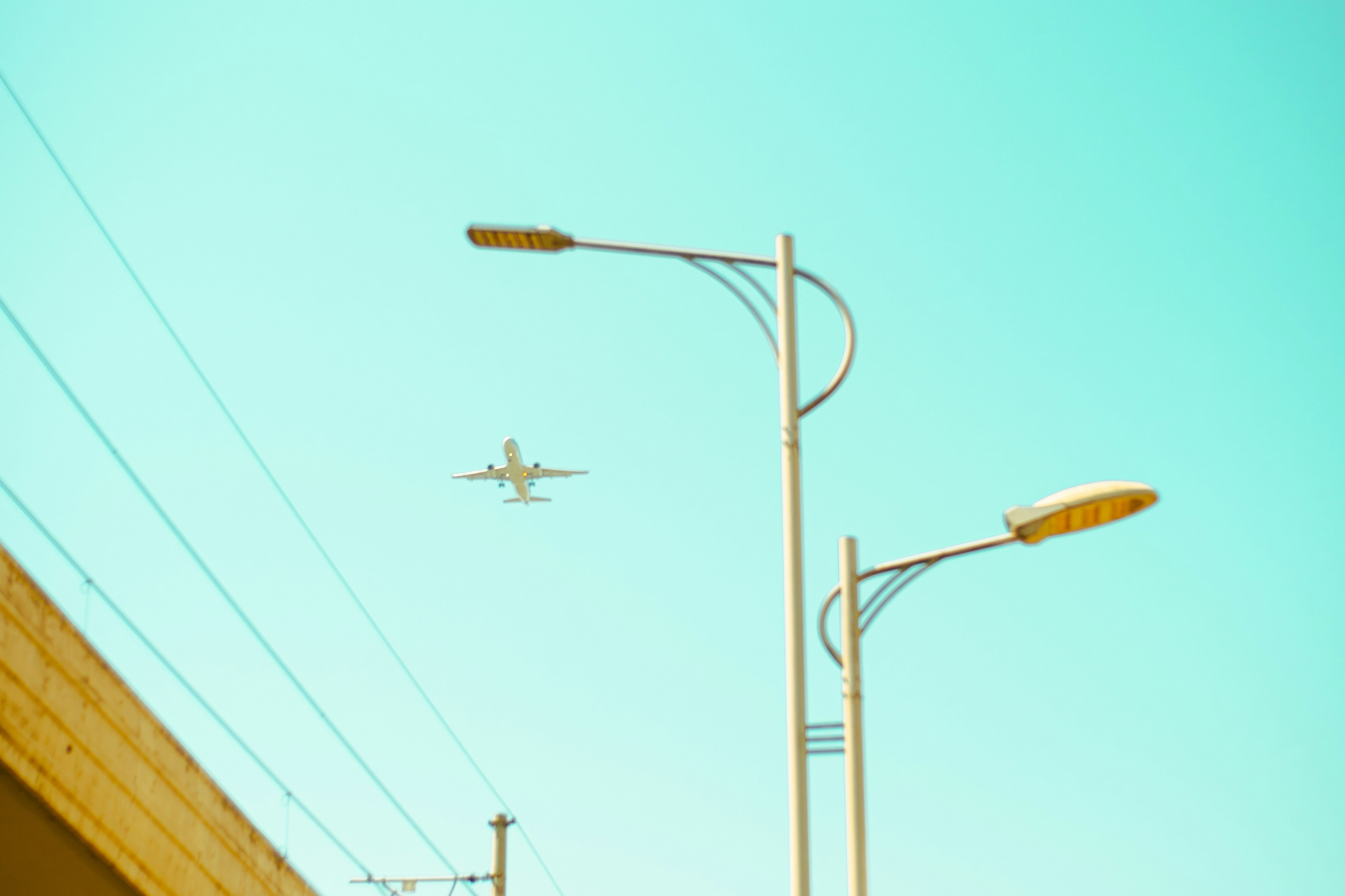 Azure Crossing Over the Streetlamp Grid
