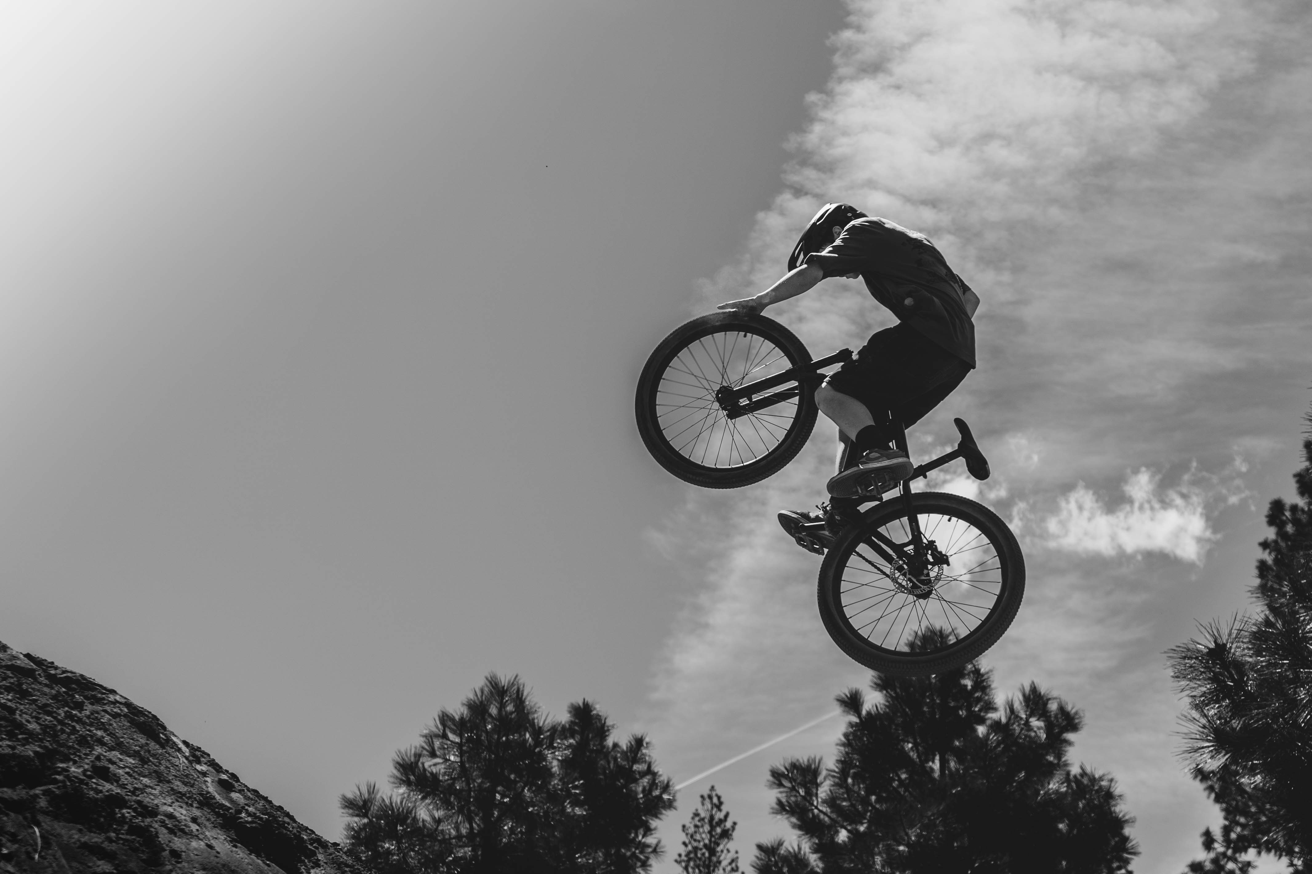 Biker performing a trick in mid-air. photo – Free Wallpaper Image on ...