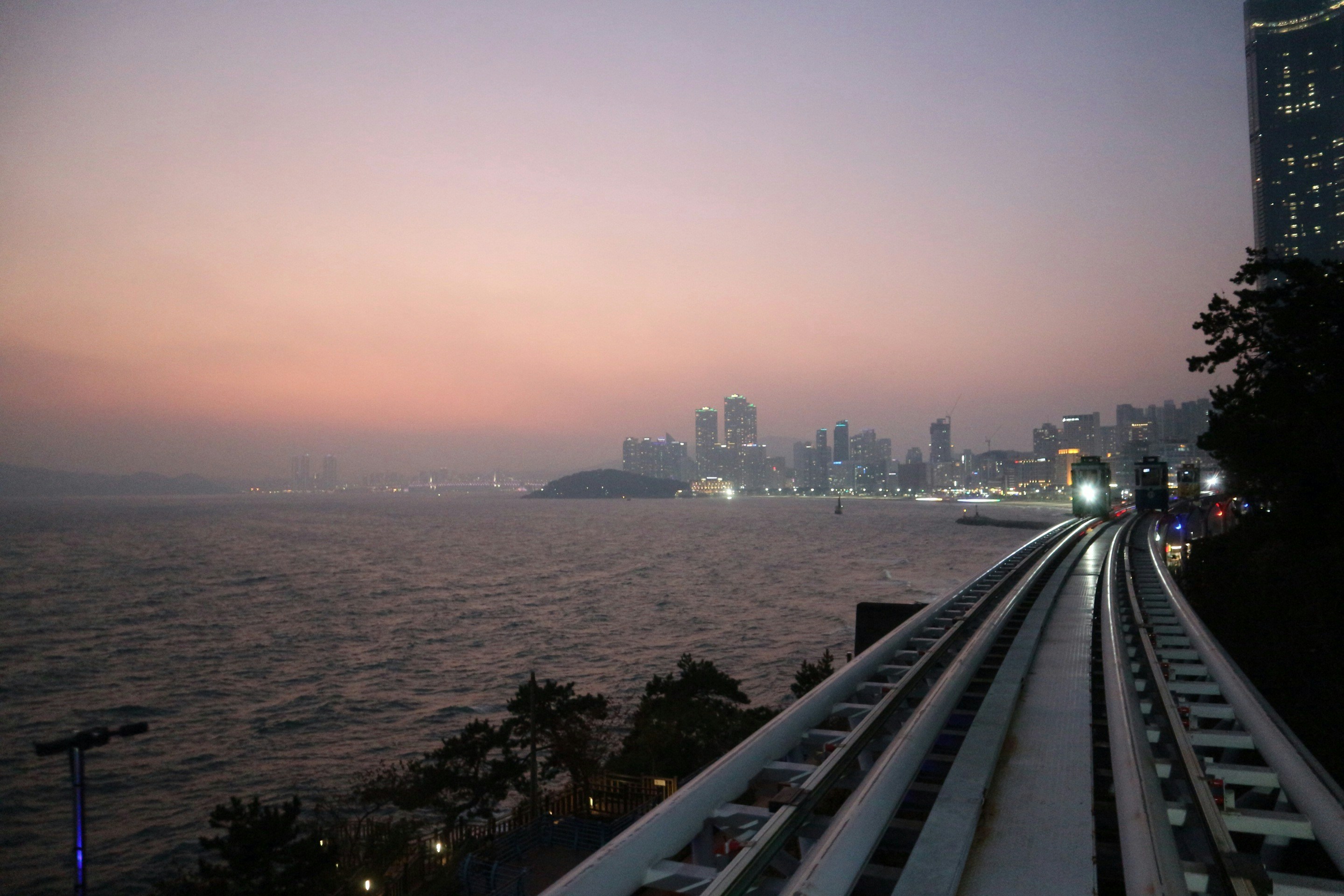 Urban Serenity: The Tranquil Embrace of City and Sea