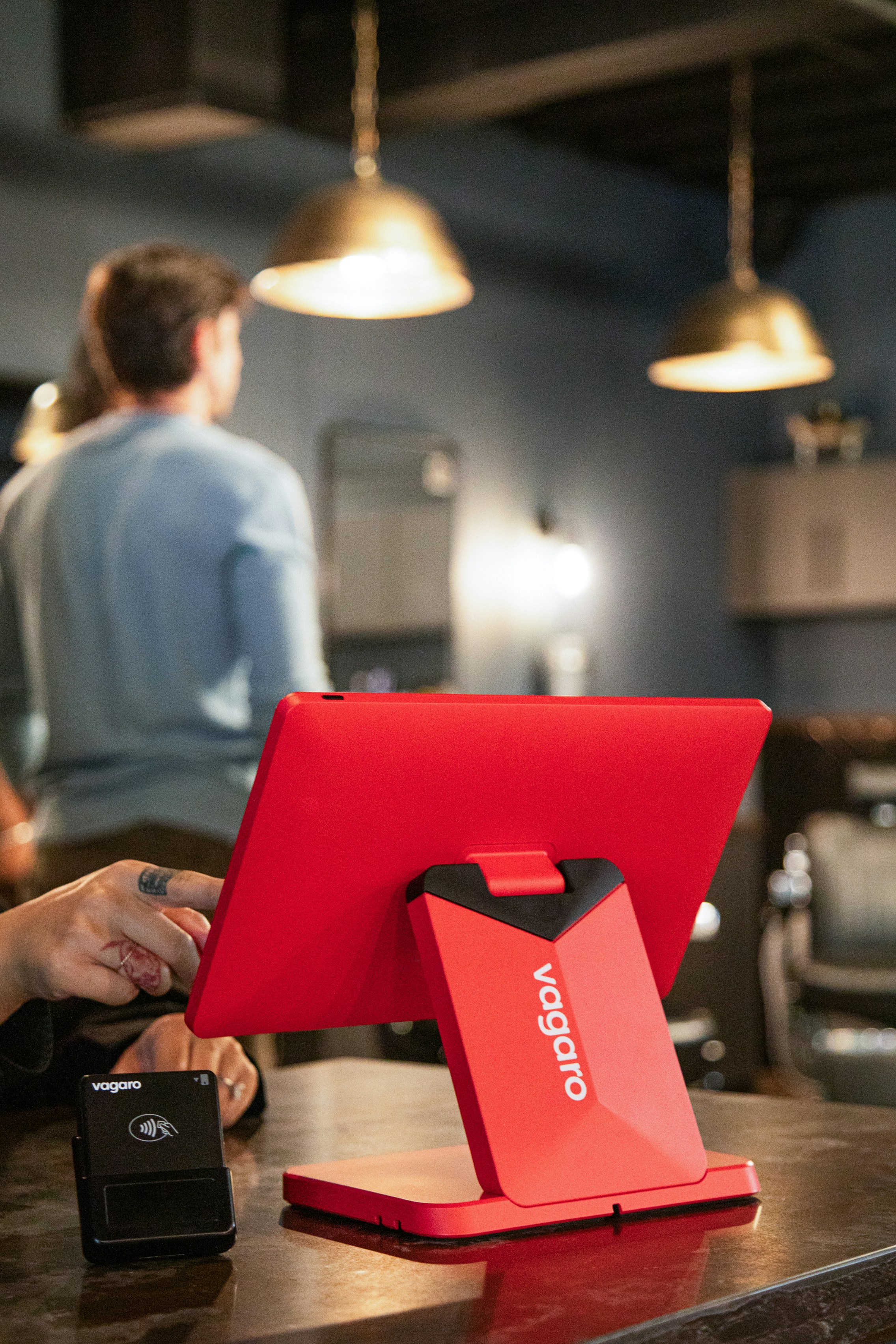 A red pos system being used in a barbershop. photo – Free Technology ...